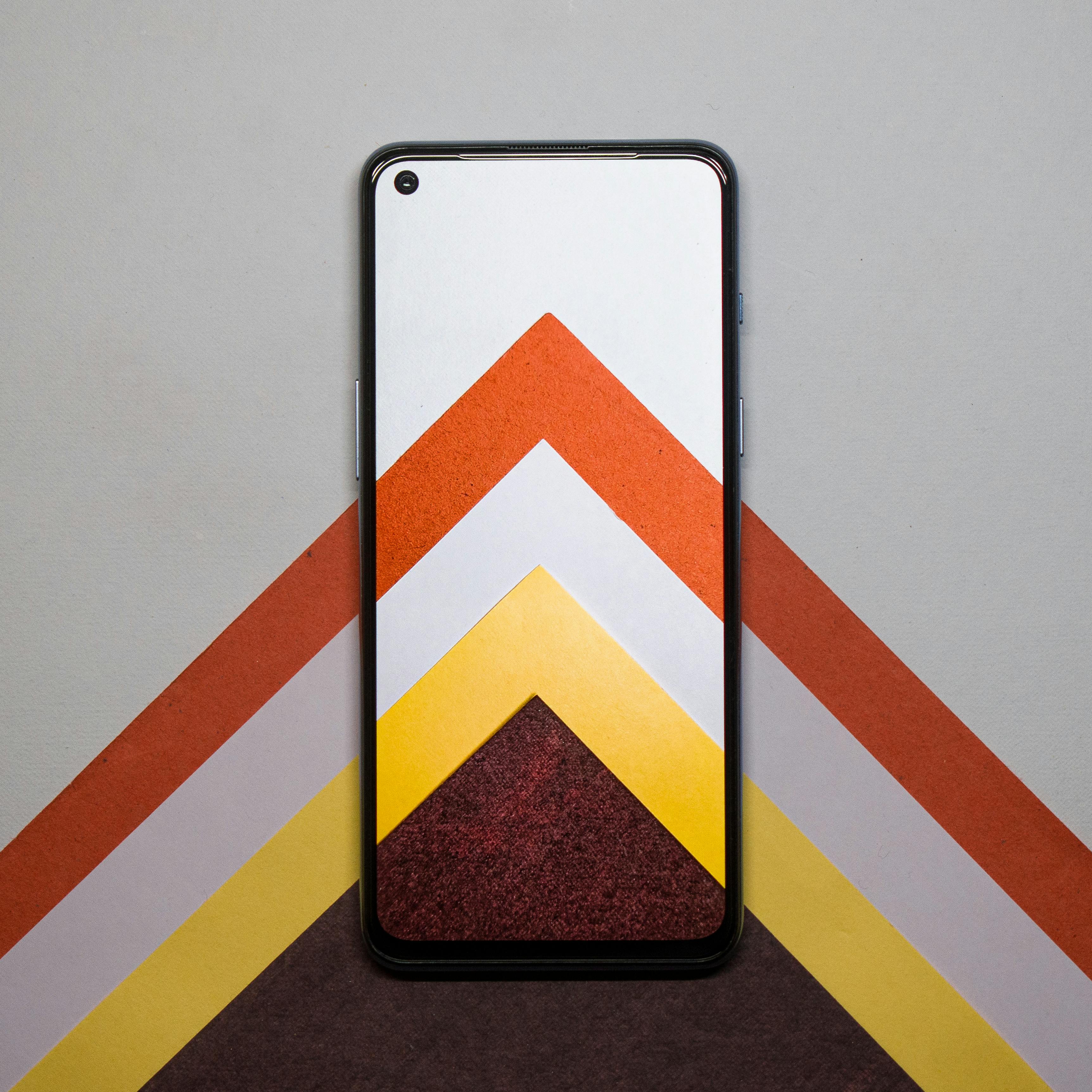 Smartphone Leaning on a Rock · Free Stock Photo