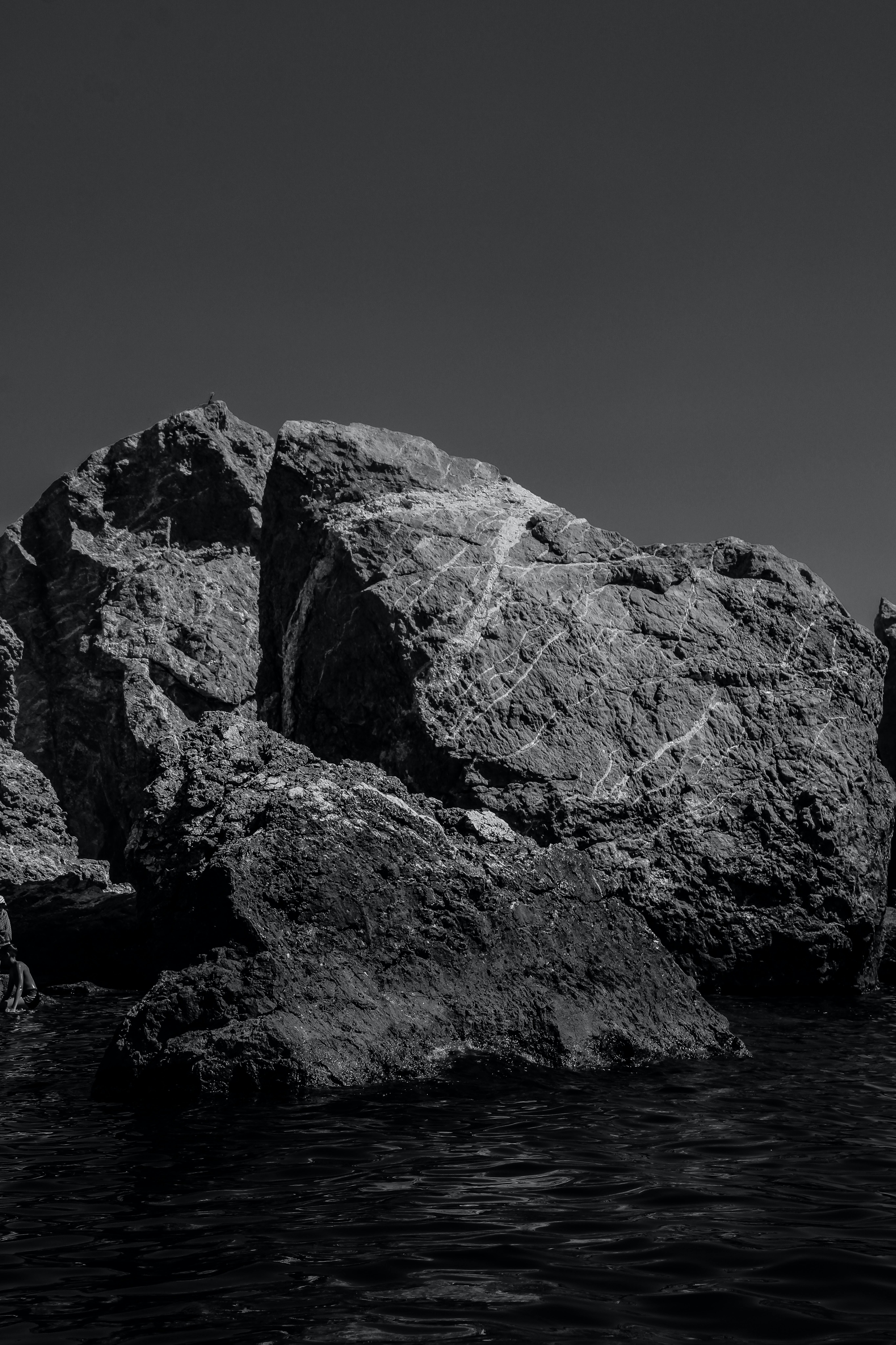 Grayscale Photo of a Rock Formation · Free Stock Photo