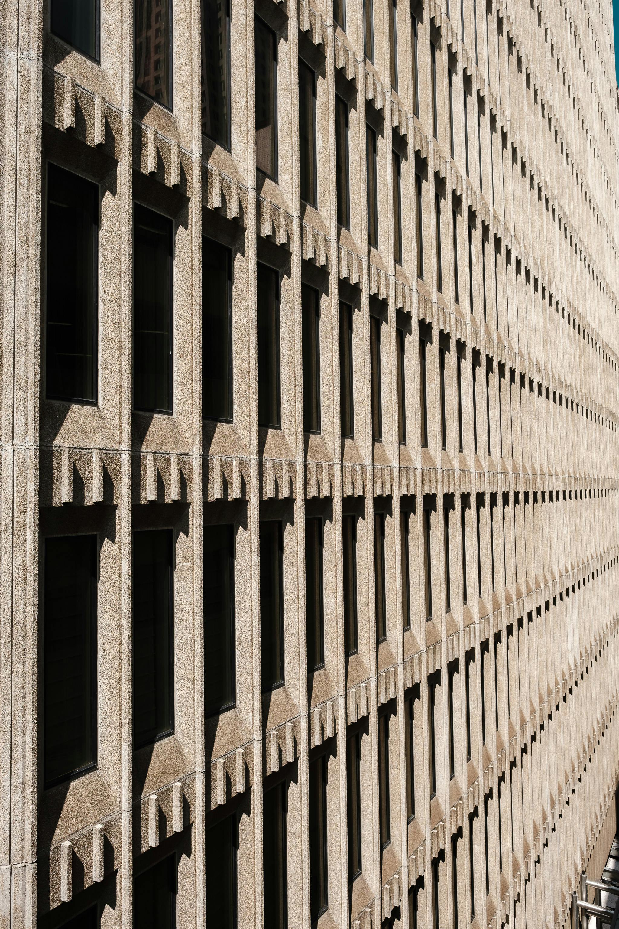 Windows of Concrete Building · Free Stock Photo