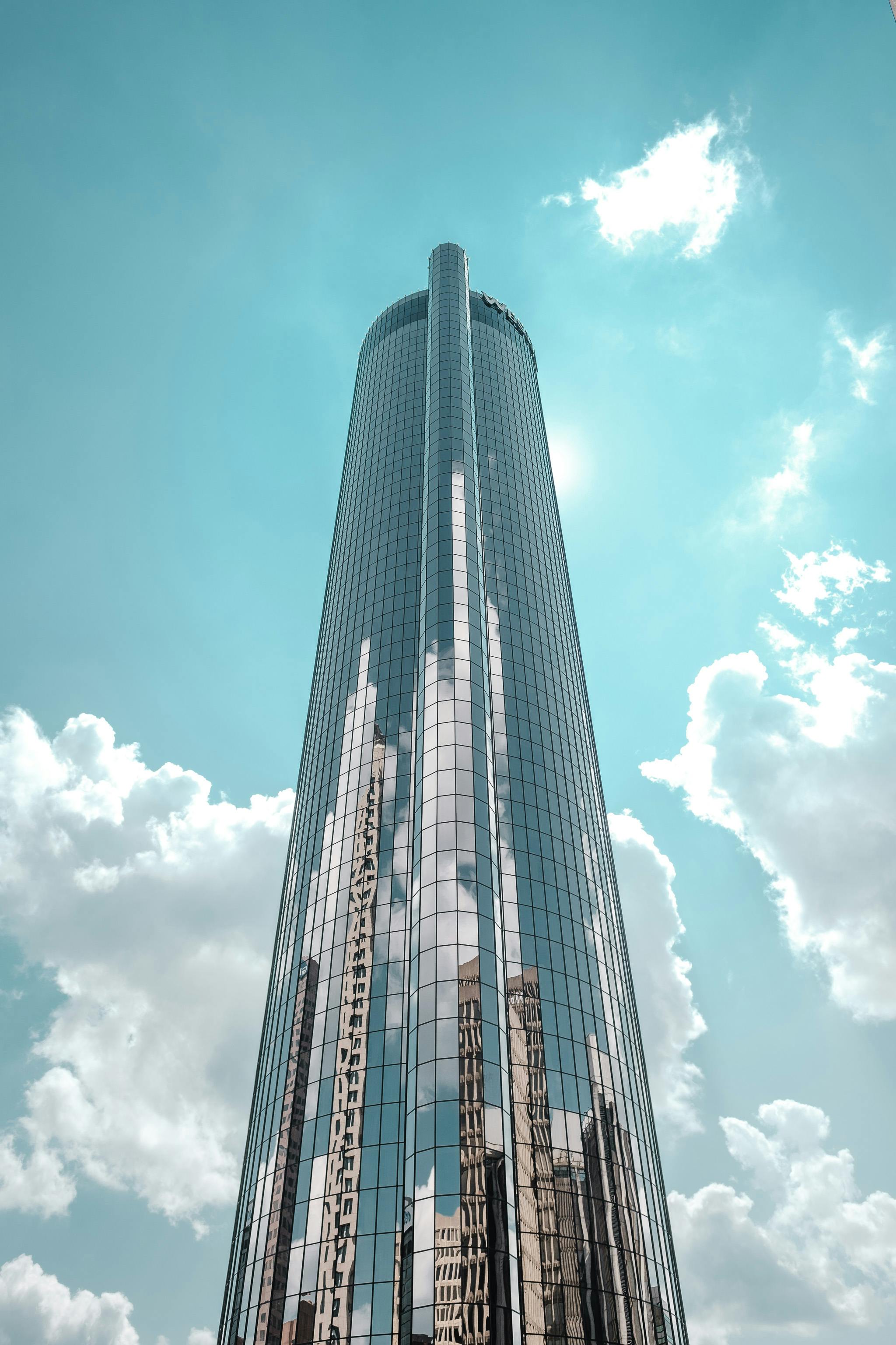 Beige Low-angle Photo High-rise Building · Free Stock Photo