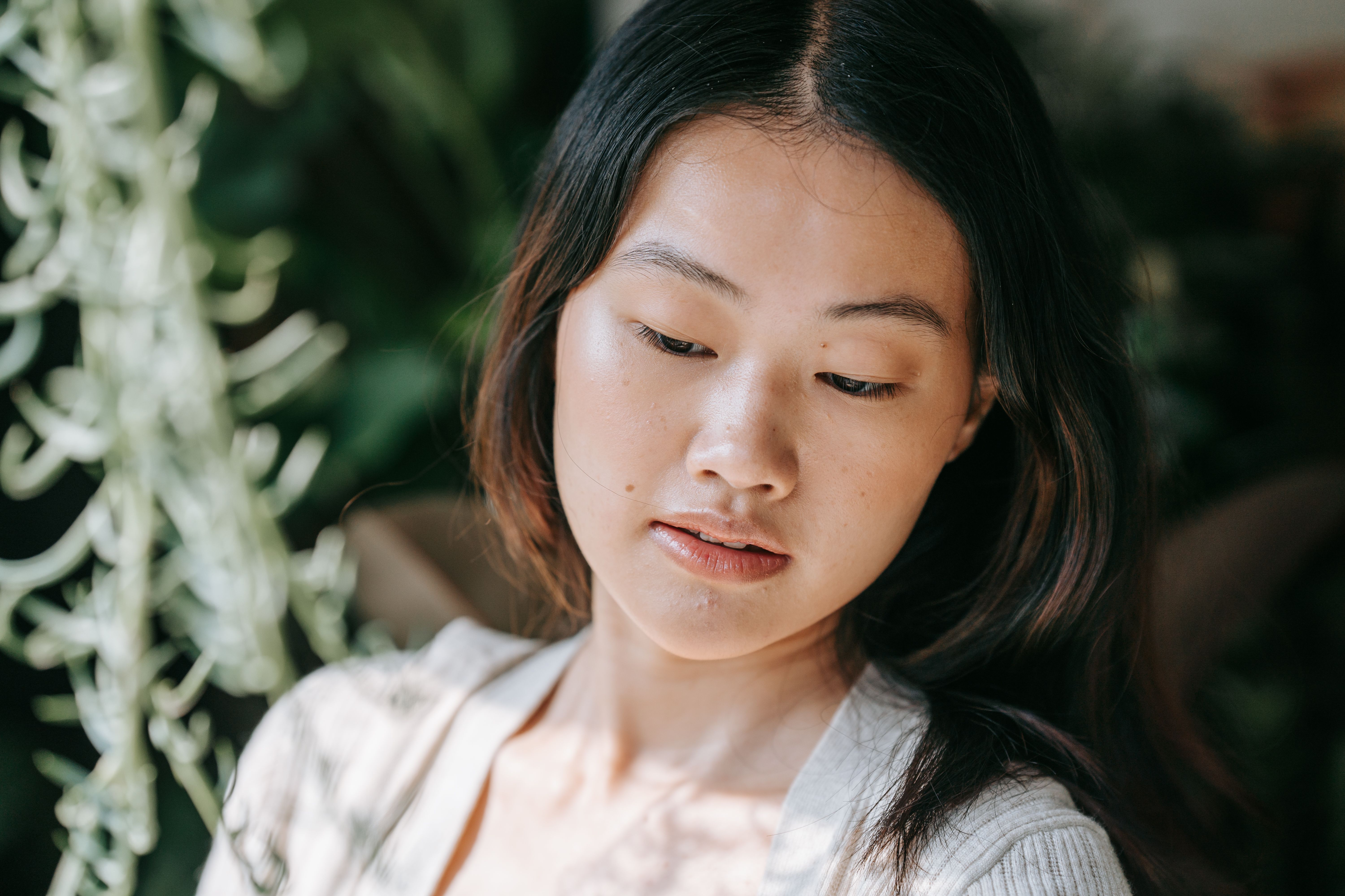 A Beautiful Woman Looking Down · Free Stock Photo