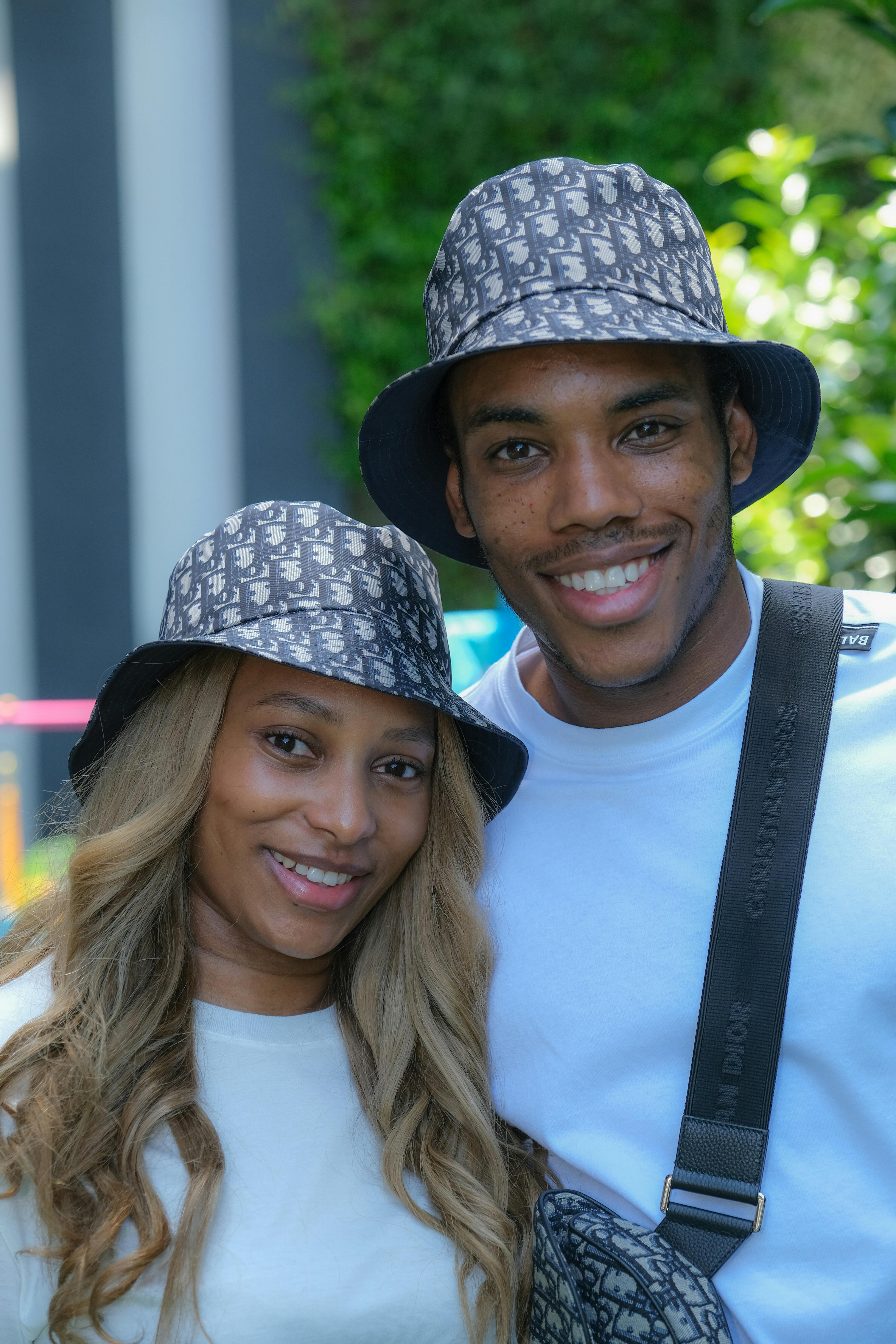 Man and Woman Wearing Hats Smiling · Free Stock Photo
