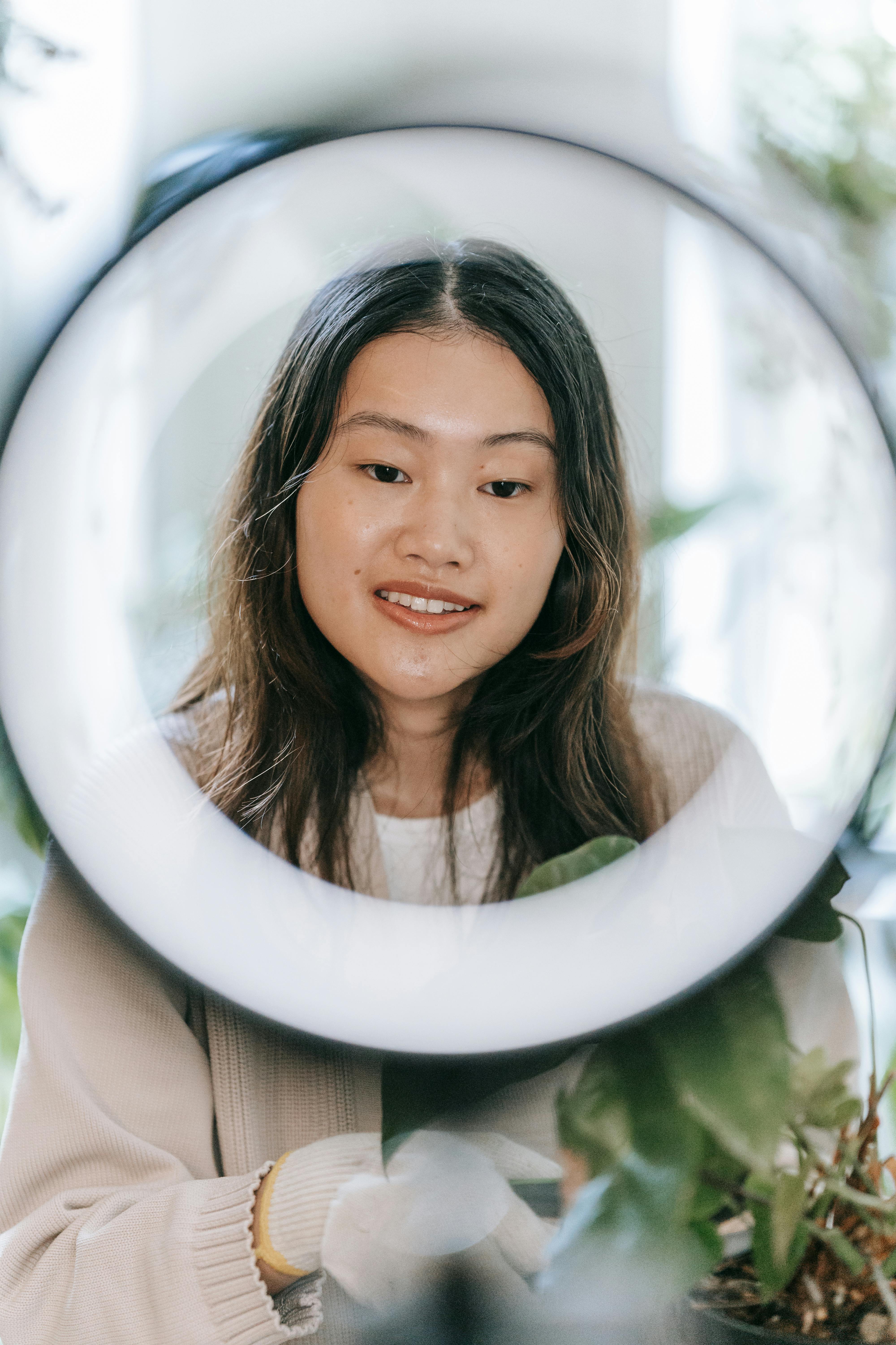 Woman With Light On Face · Free Stock Photo