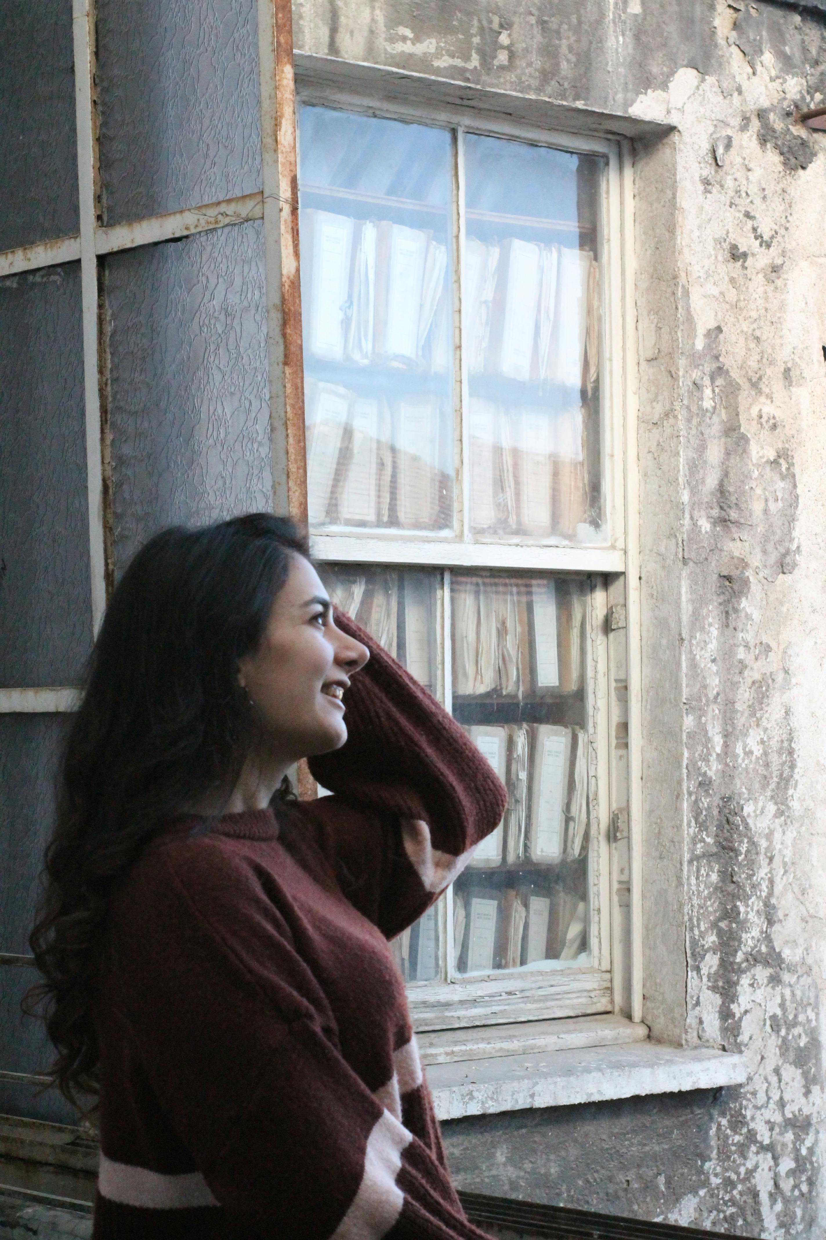 Woman Looking Outside the Window · Free Stock Photo