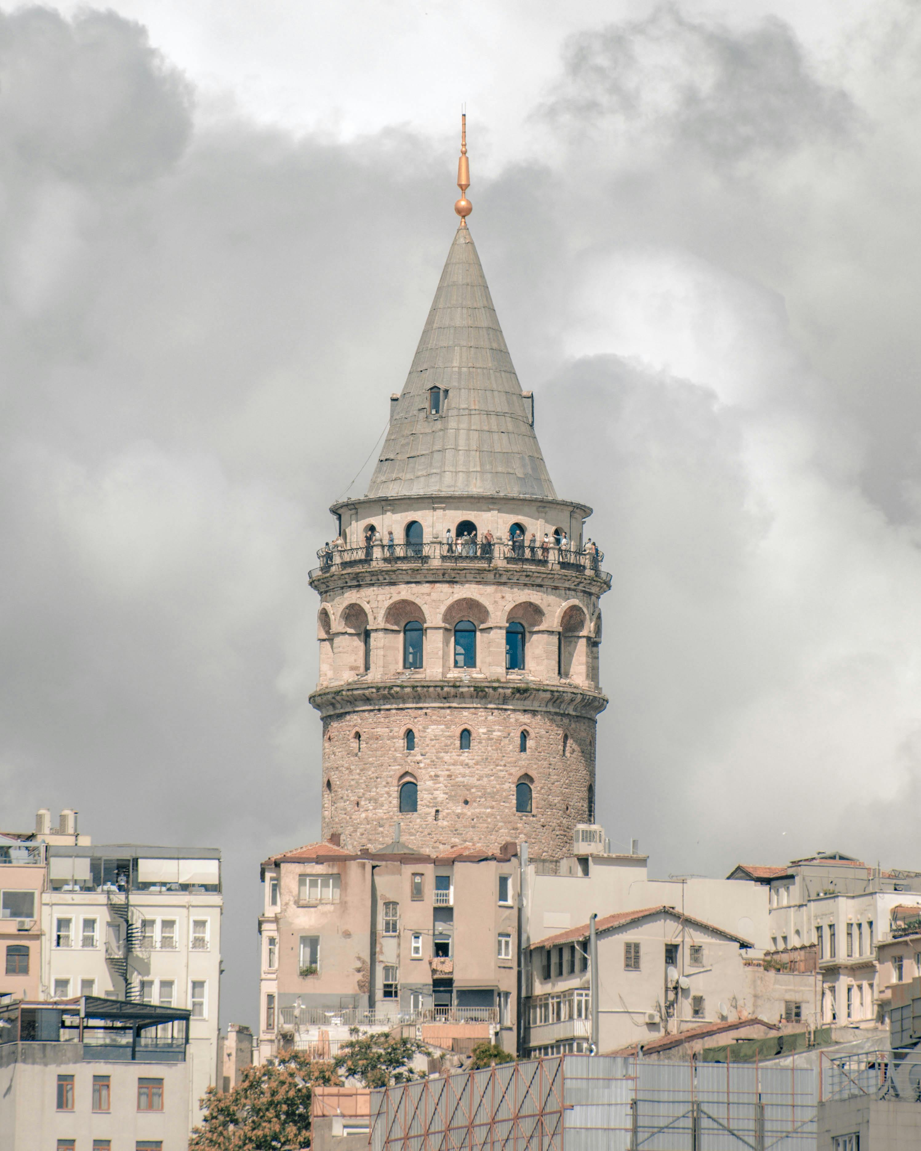 The Galata Tower Between Buildings · Free Stock Photo