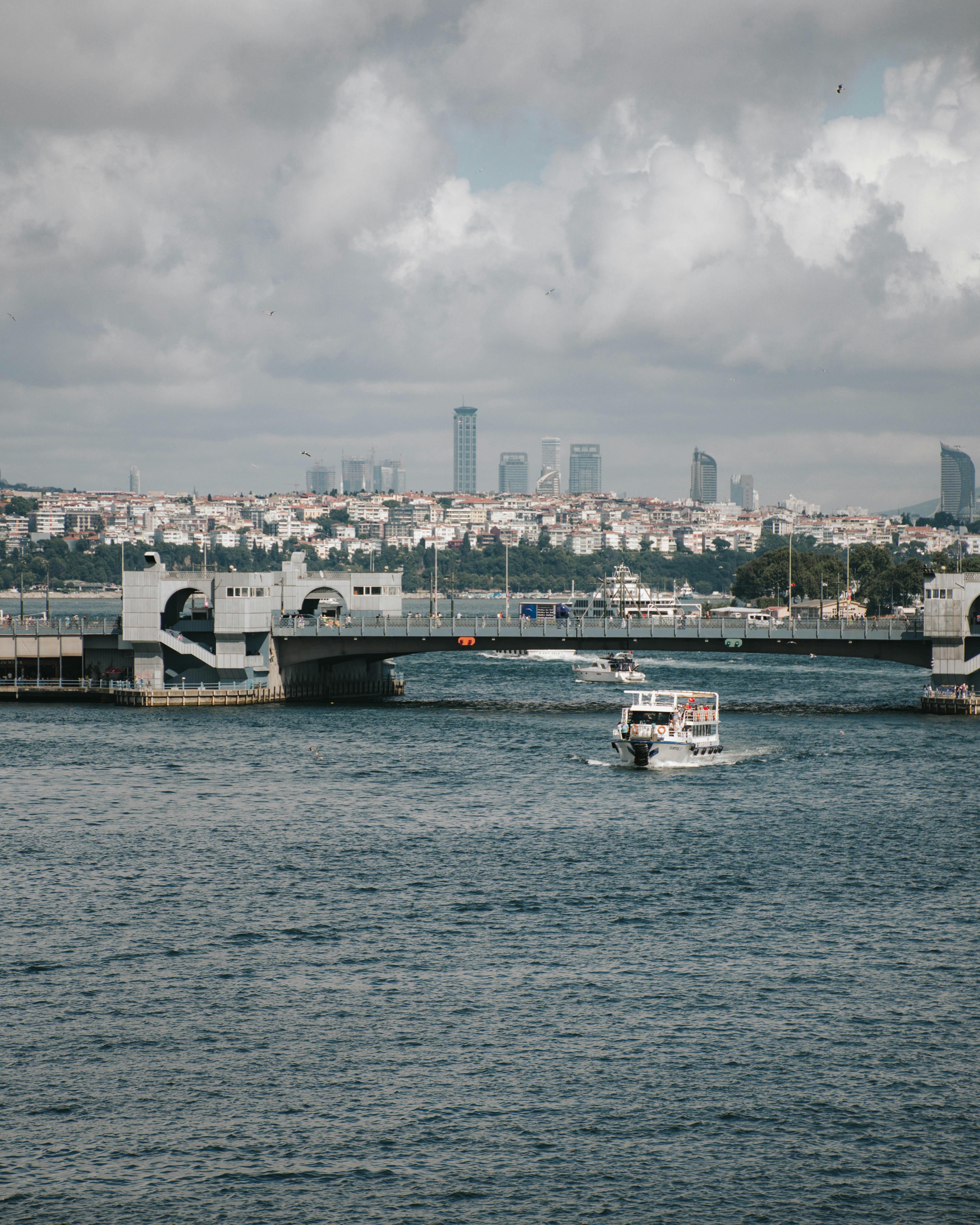 Boats Sailing under Bridge on River · Free Stock Photo