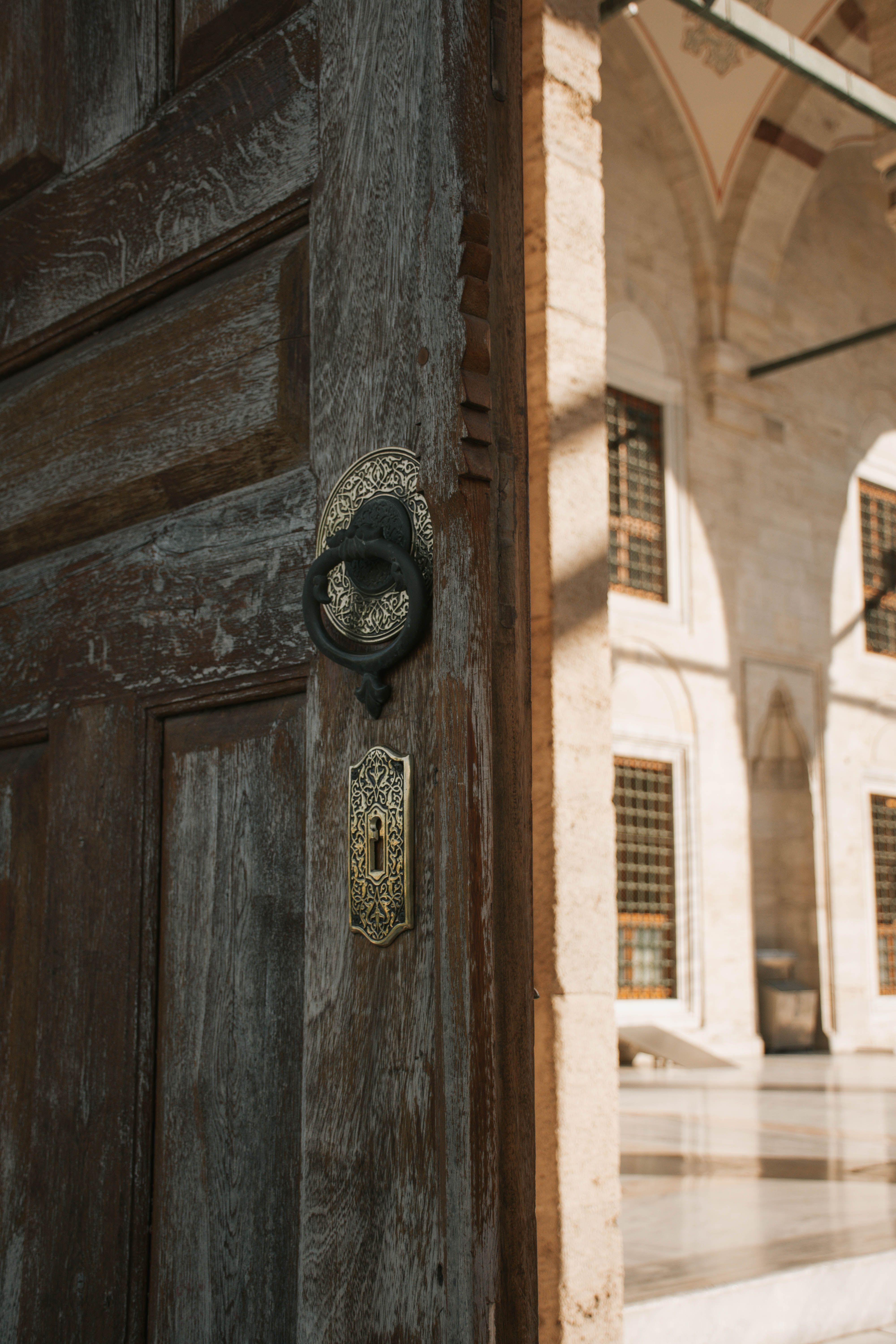 Close-Up Shot of a Person Opening a Door · Free Stock Photo