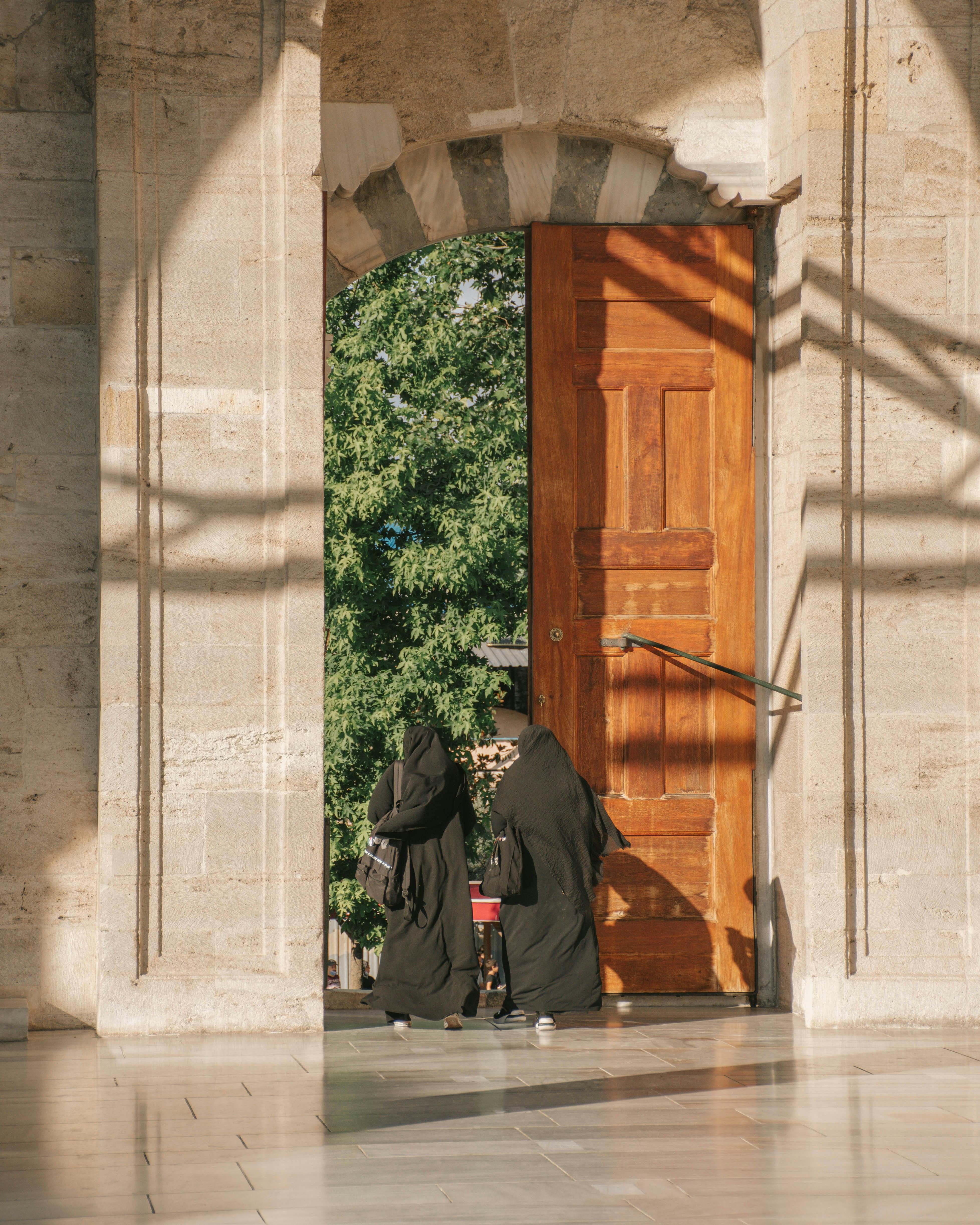 A Man Standing on an Open Door · Free Stock Photo