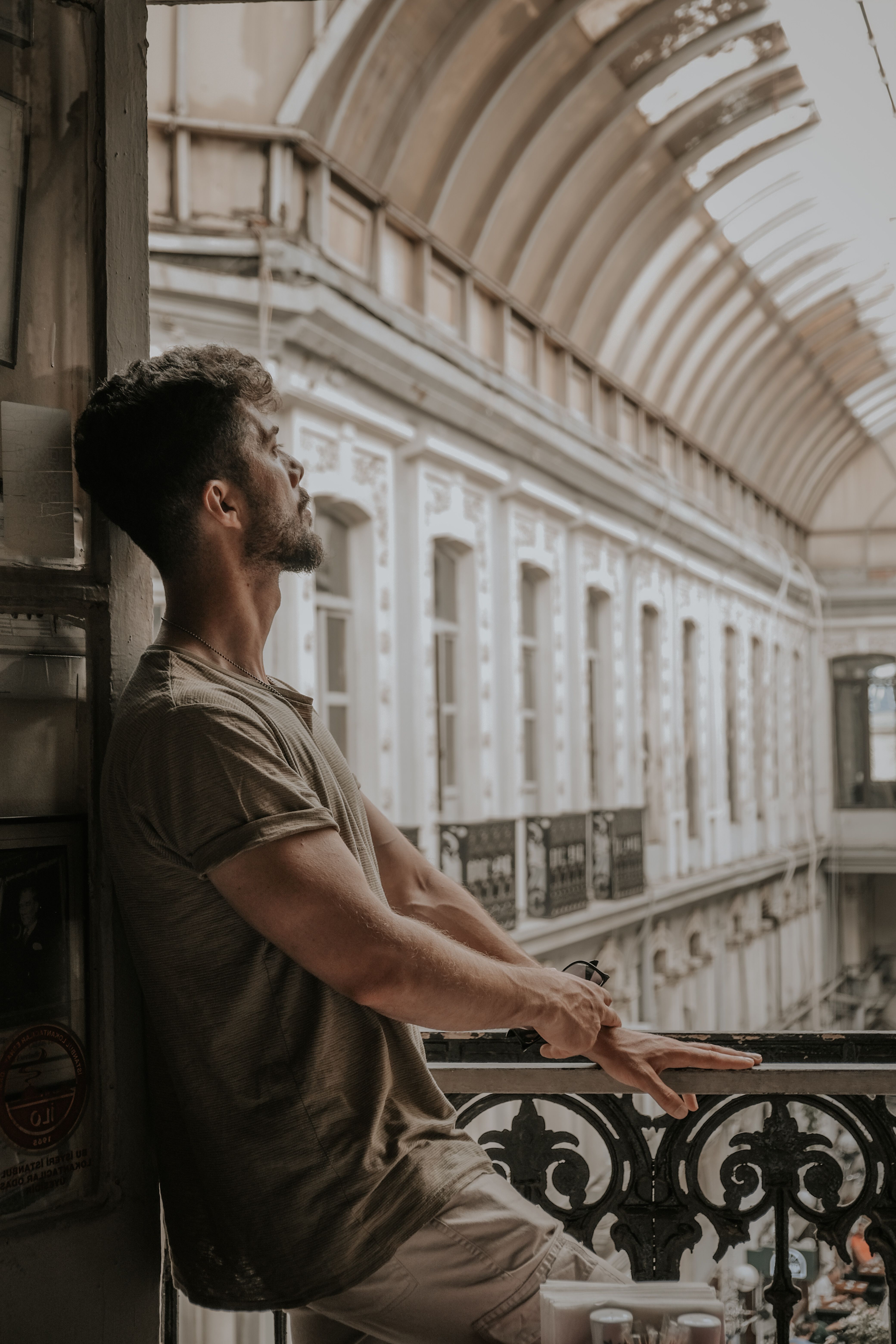 Man Standing in a Balcony · Free Stock Photo