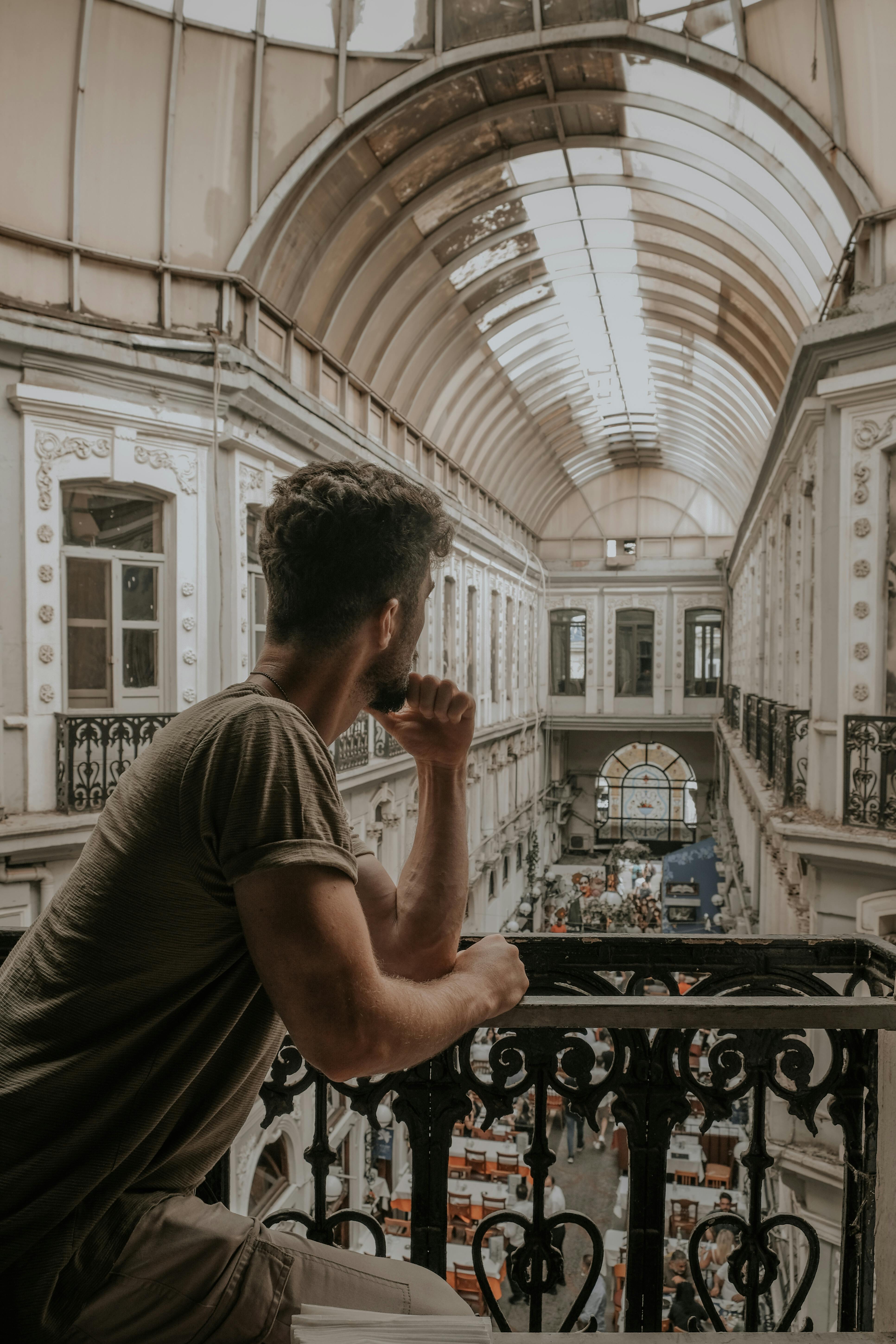 Man Standing Near Railing · Free Stock Photo