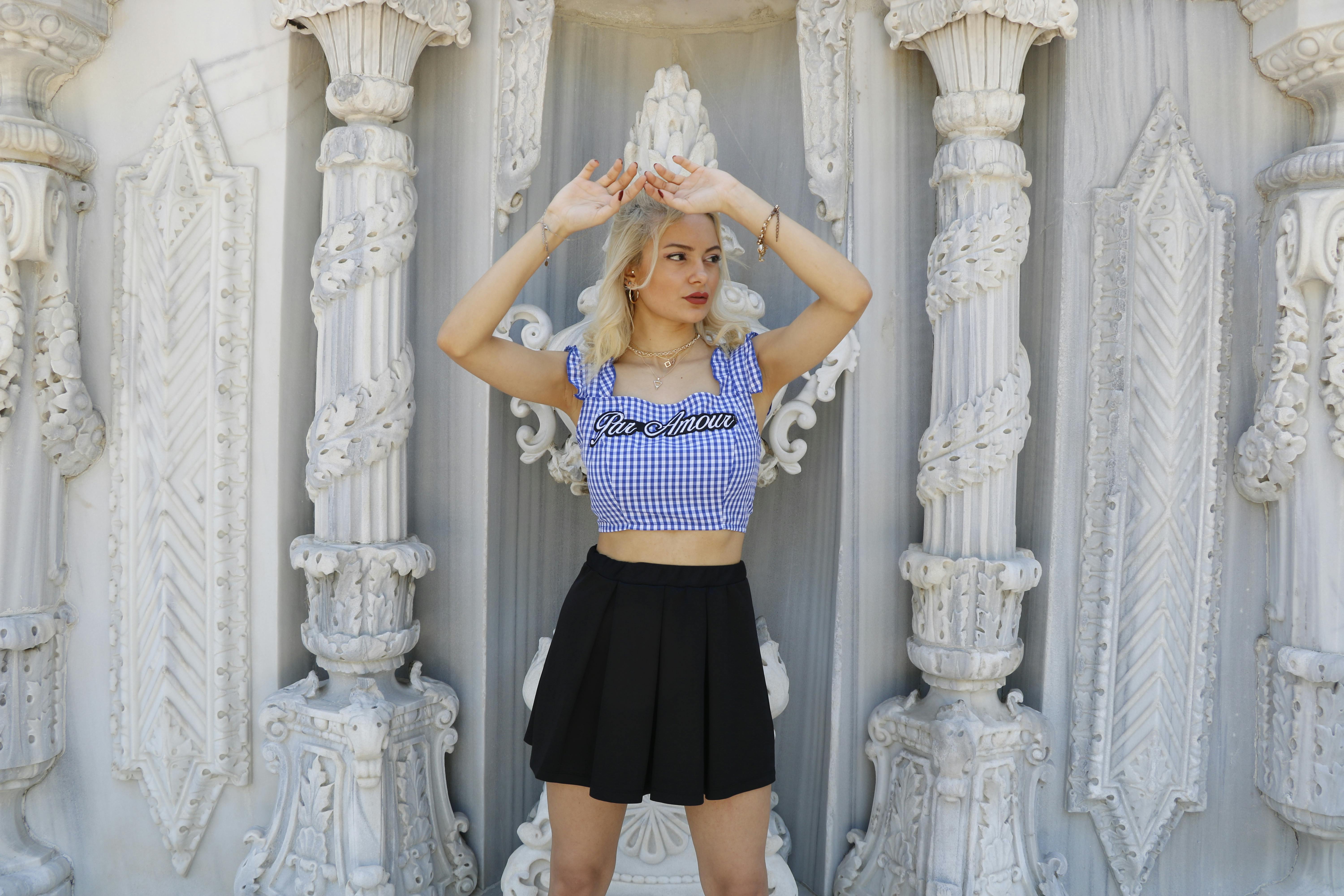 Girl Posing on Wooden Platform in Beach · Free Stock Photo