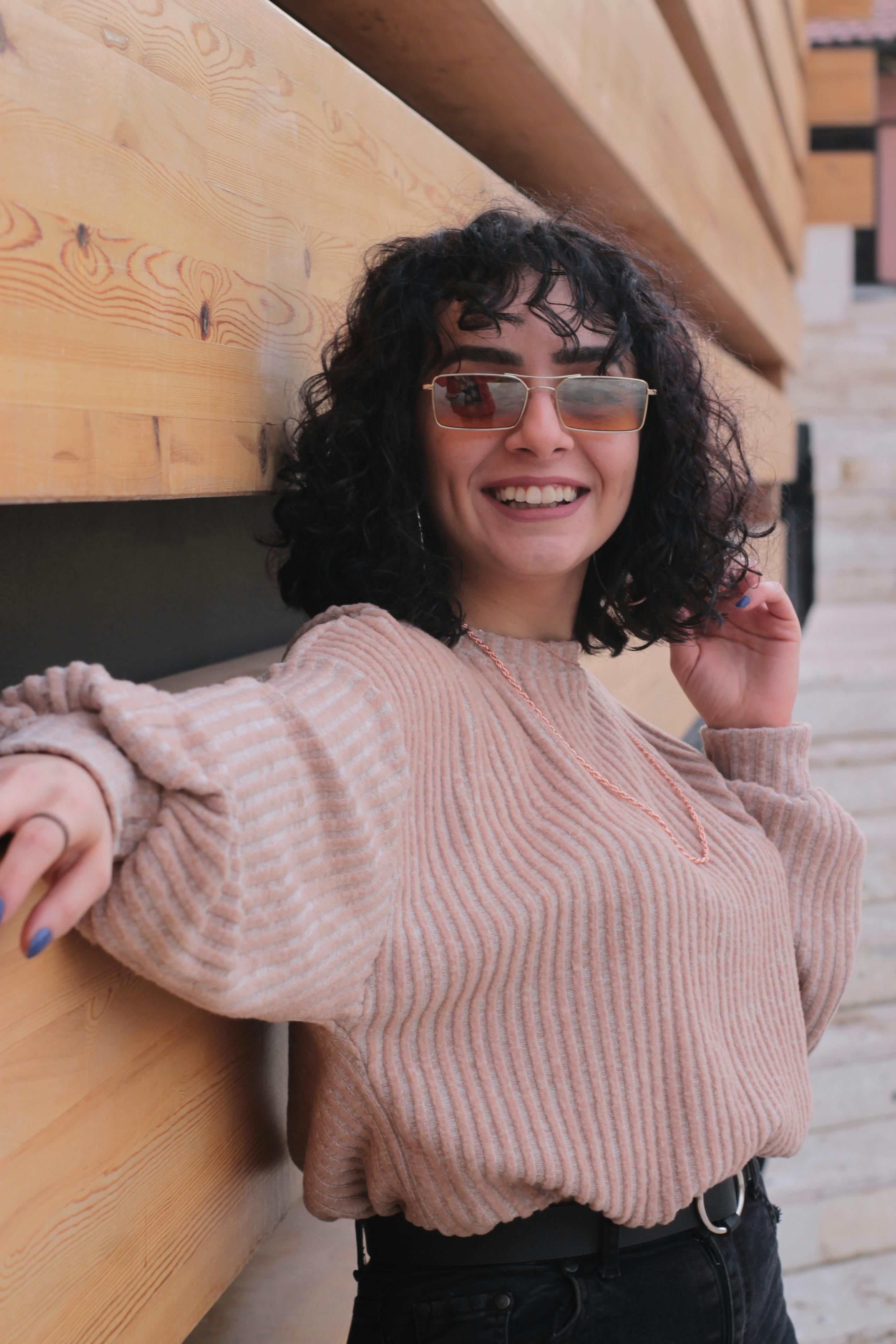 Woman Posing near Wall · Free Stock Photo