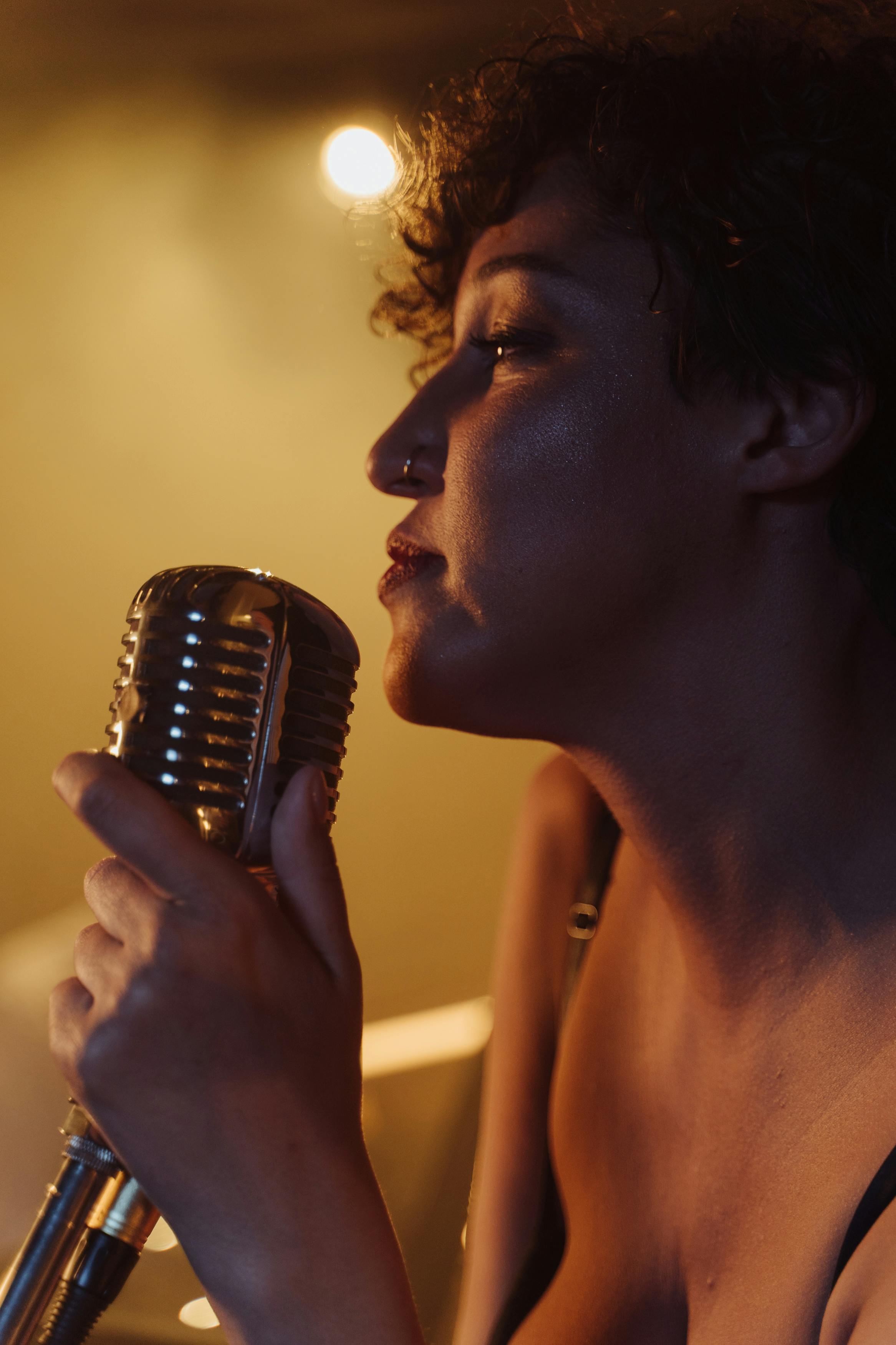 A Person using Microphone · Free Stock Photo