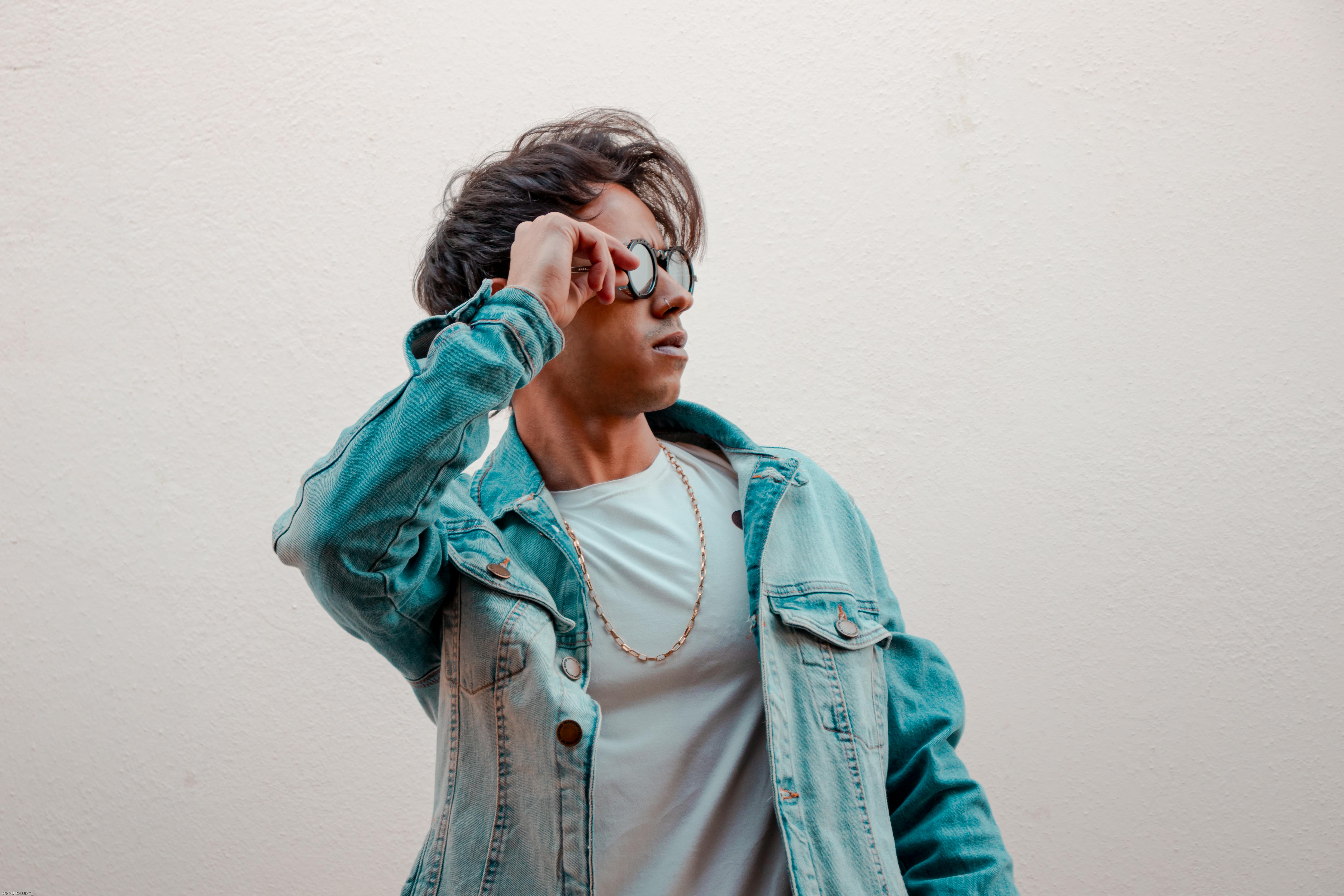 Four Male Models Posing on White Background · Free Stock Photo