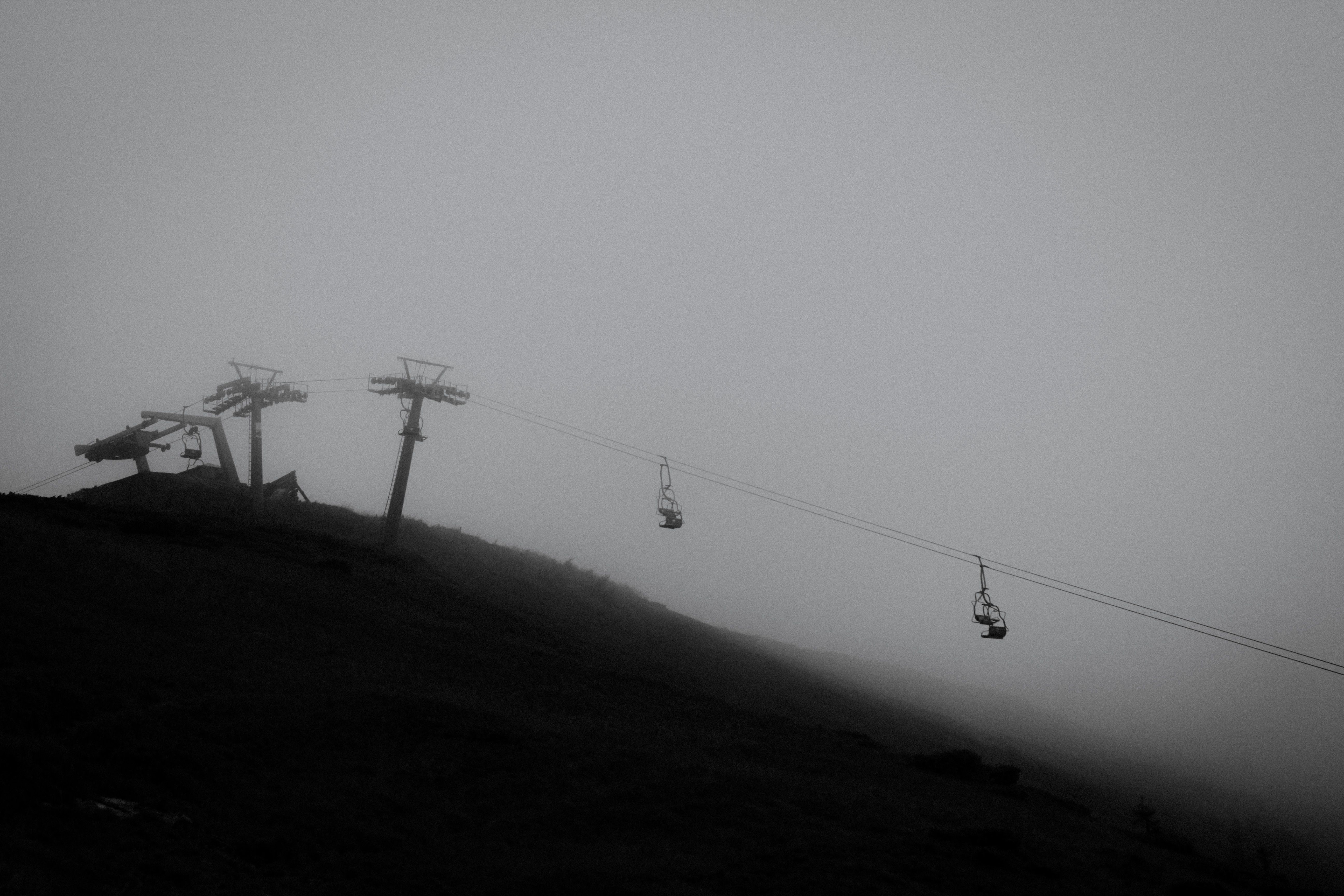 Grayscale Photo of Cable Cars · Free Stock Photo
