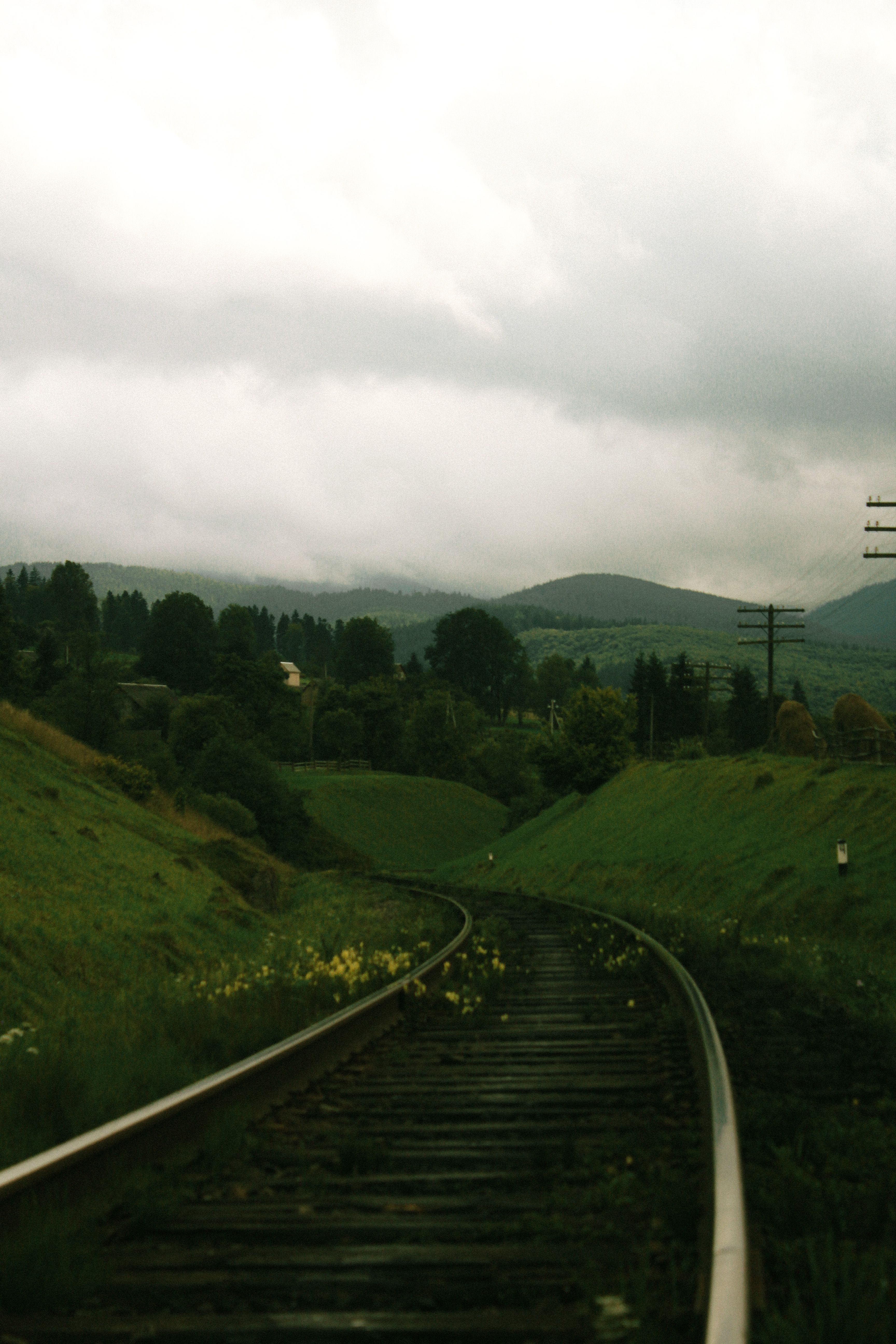 Railway between Hills · Free Stock Photo