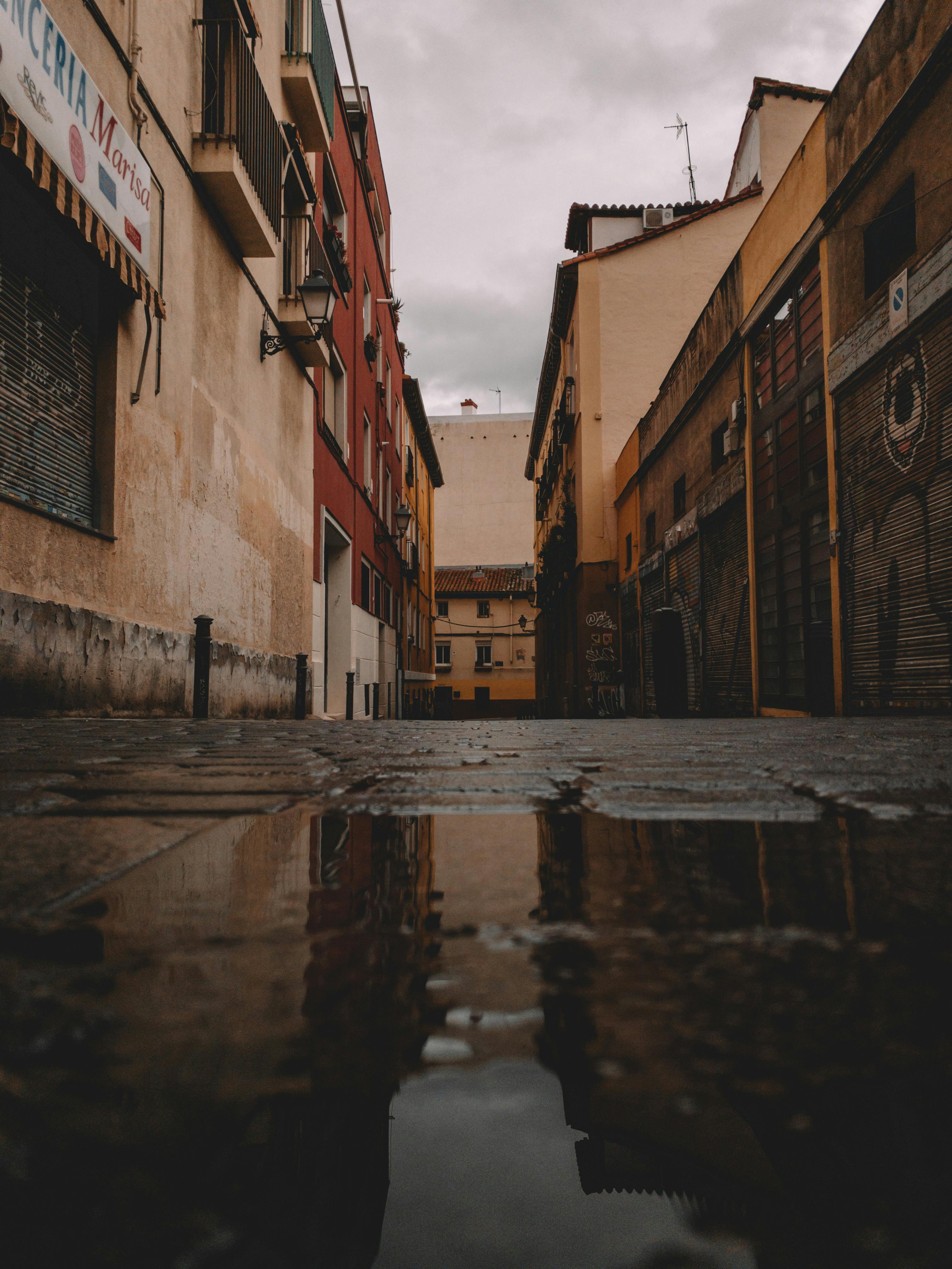 An Empty Alley between Buildings · Free Stock Photo