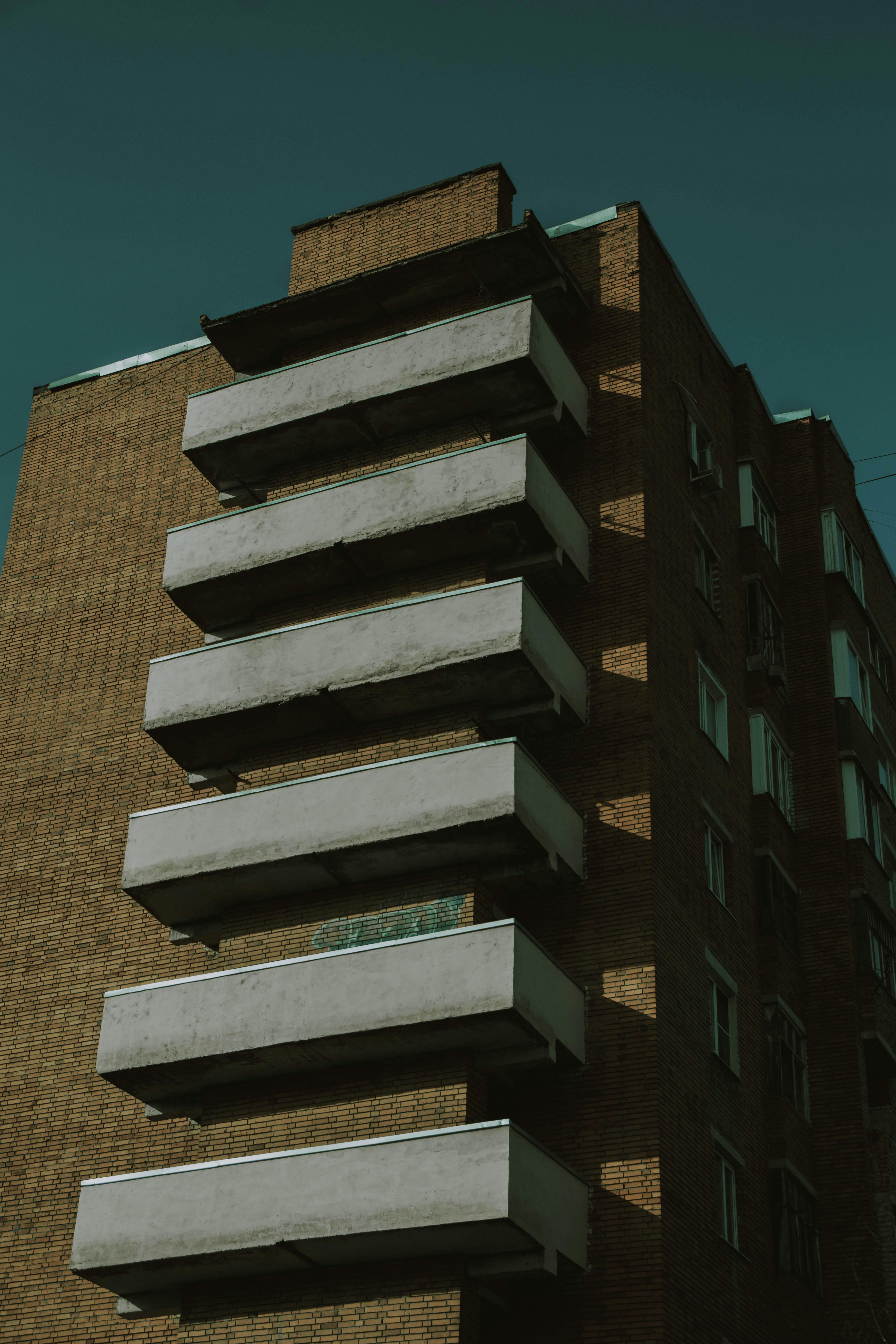 Plants on Balconies in Building · Free Stock Photo