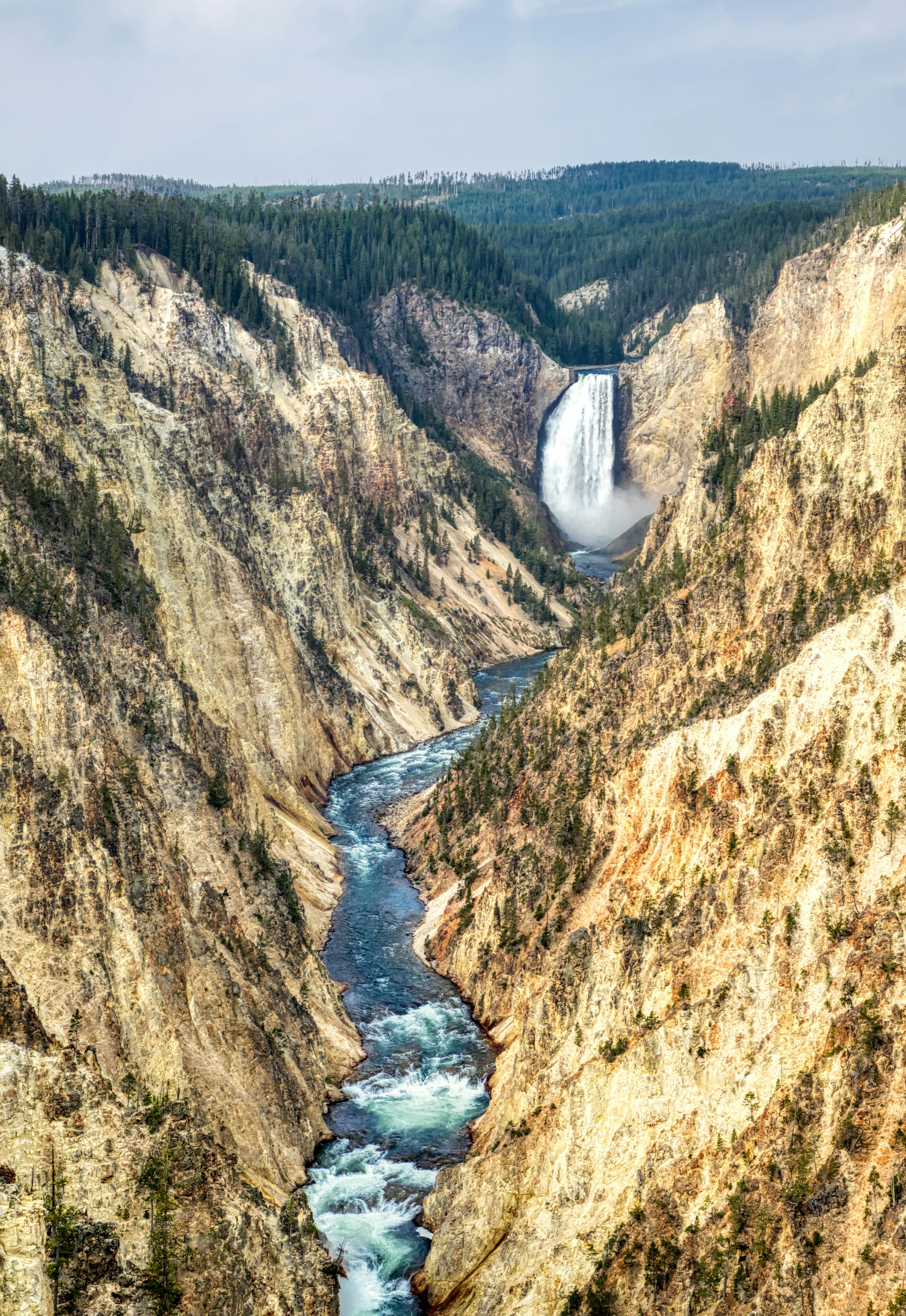 River in the Middle of Brown and Green Mountains · Free Stock Photo