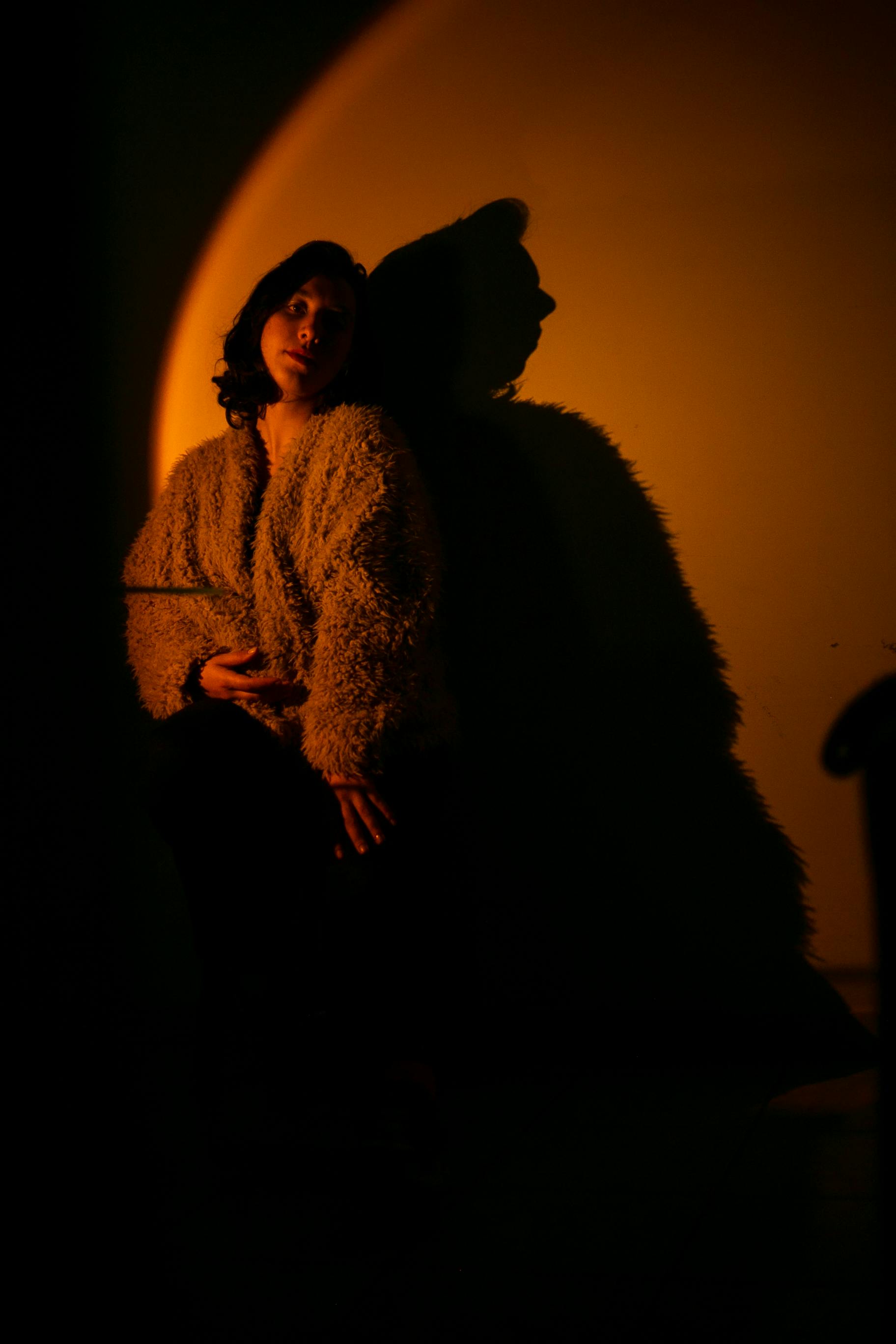 Girl Posing in Light Shadow · Free Stock Photo