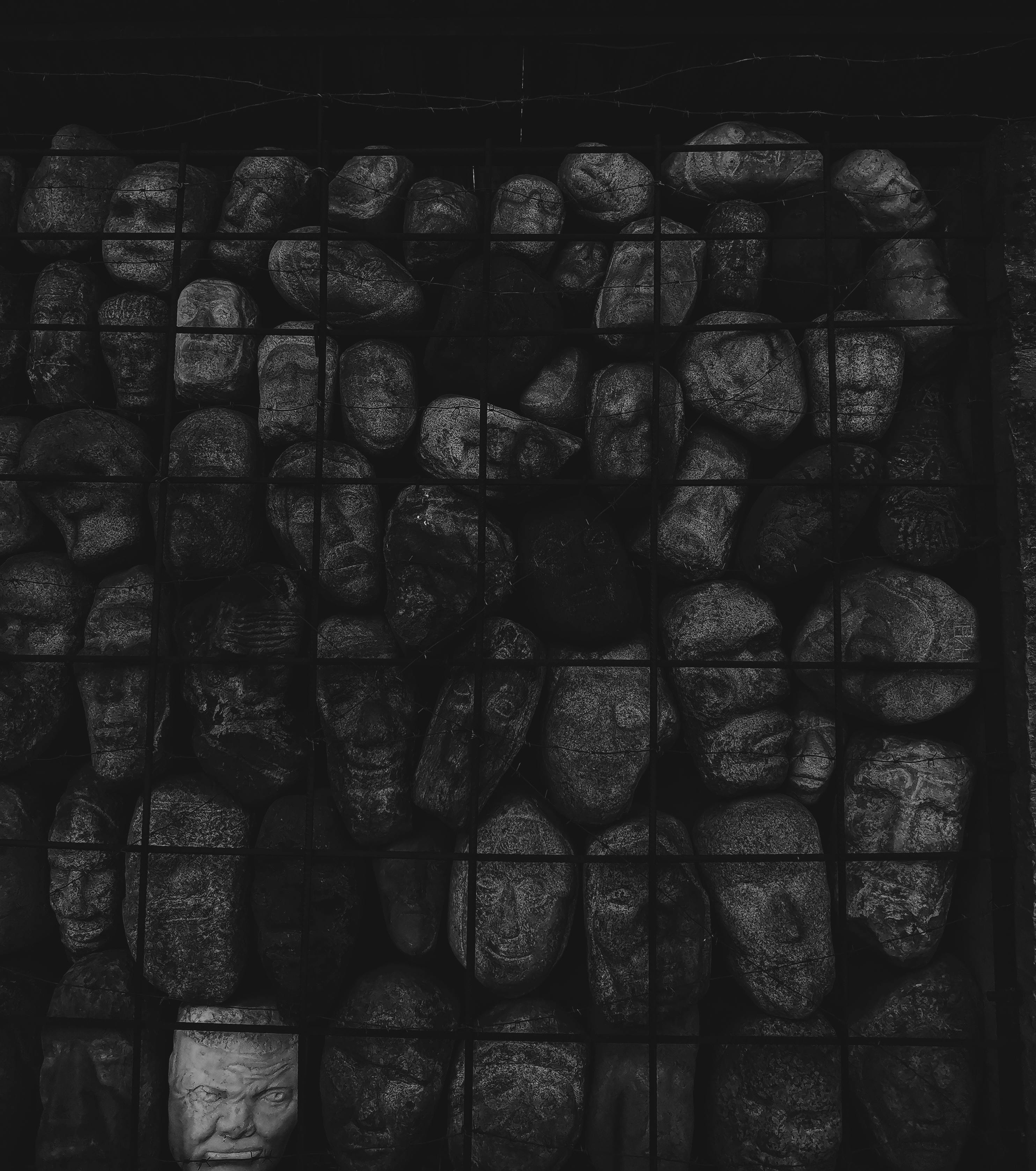 Grayscale Photo of Black Carved Stones · Free Stock Photo