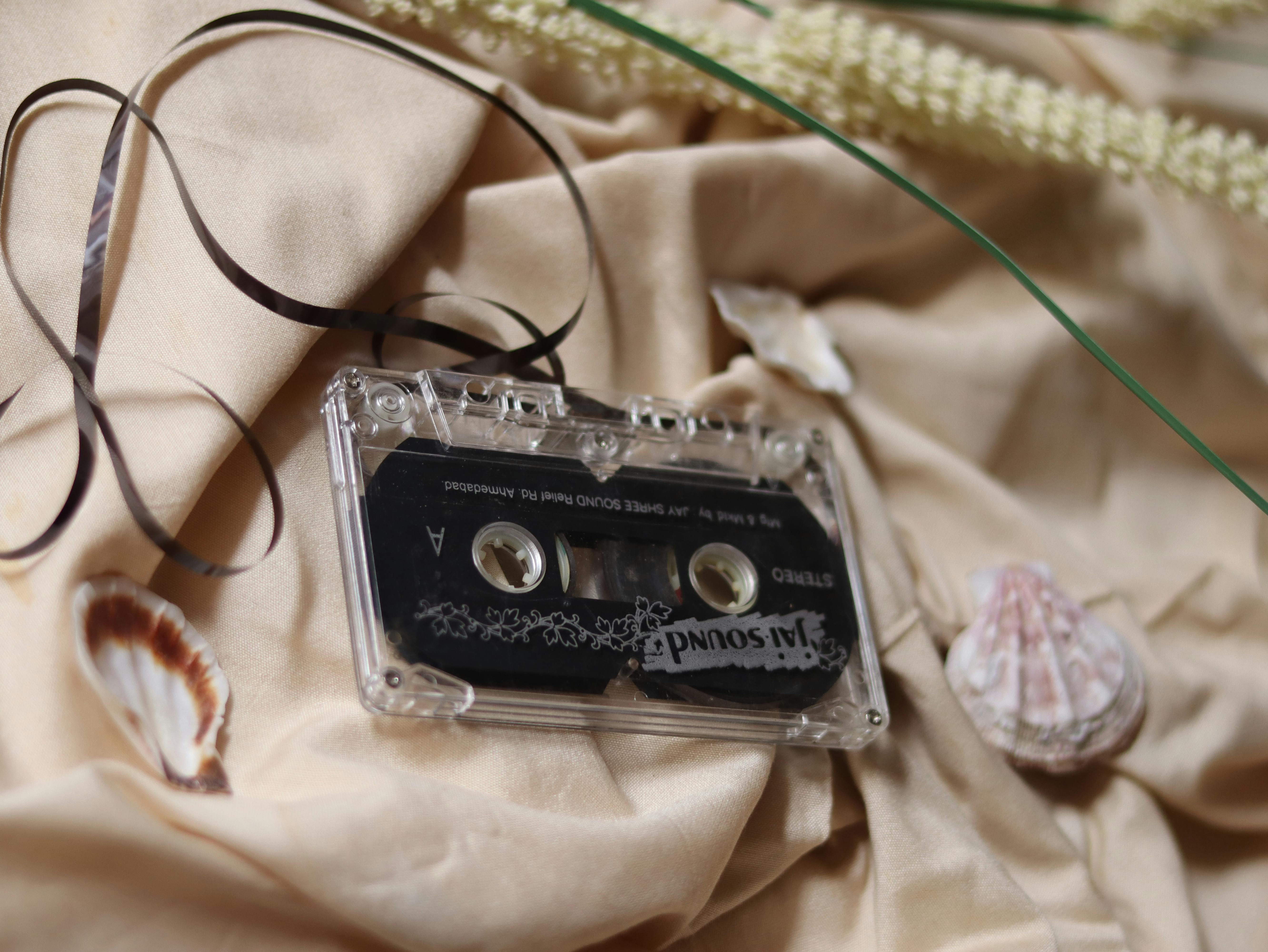 Person Holding Black Cassette Tape · Free Stock Photo