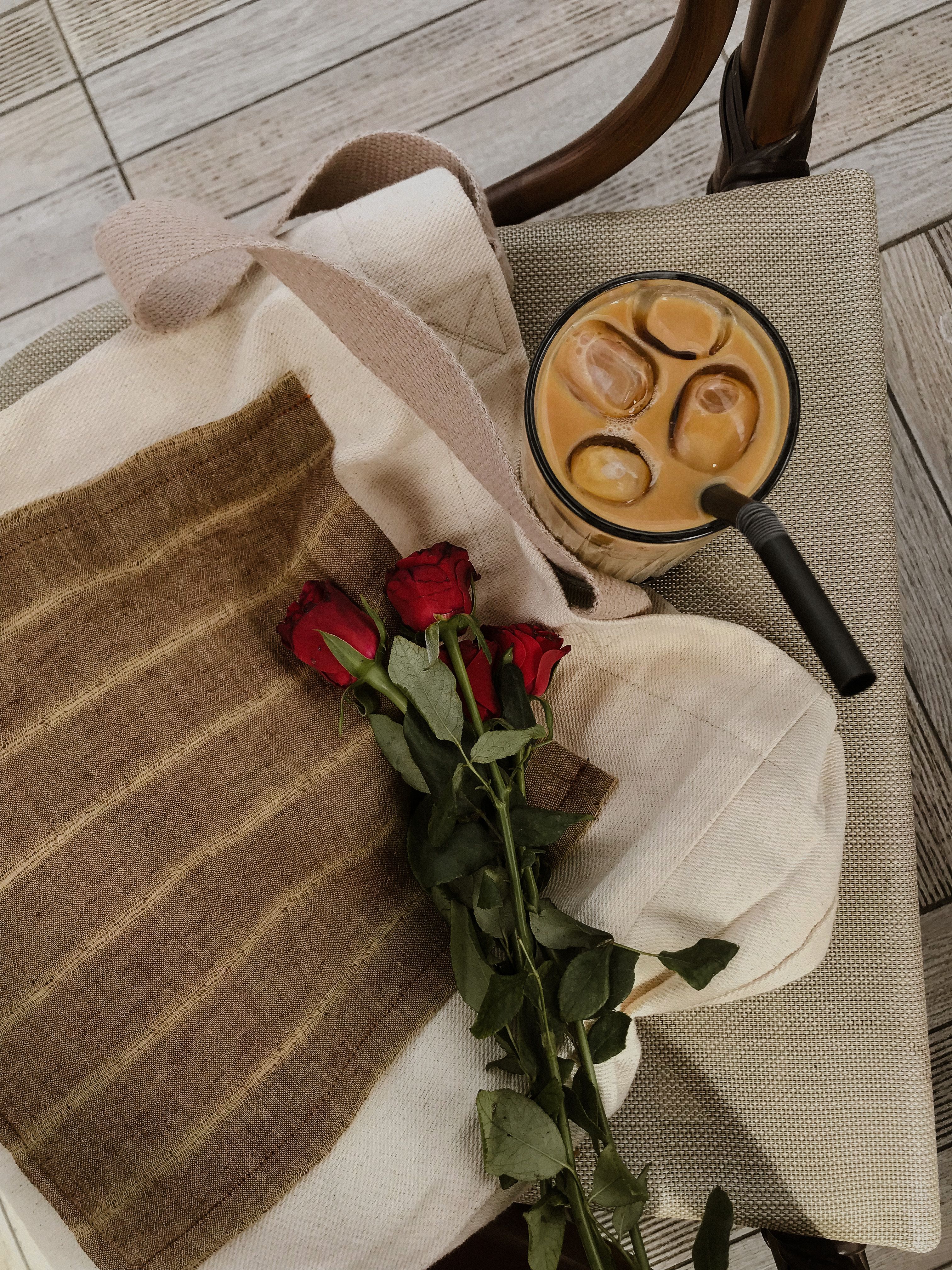 Iced Coffee beside Red Roses · Free Stock Photo
