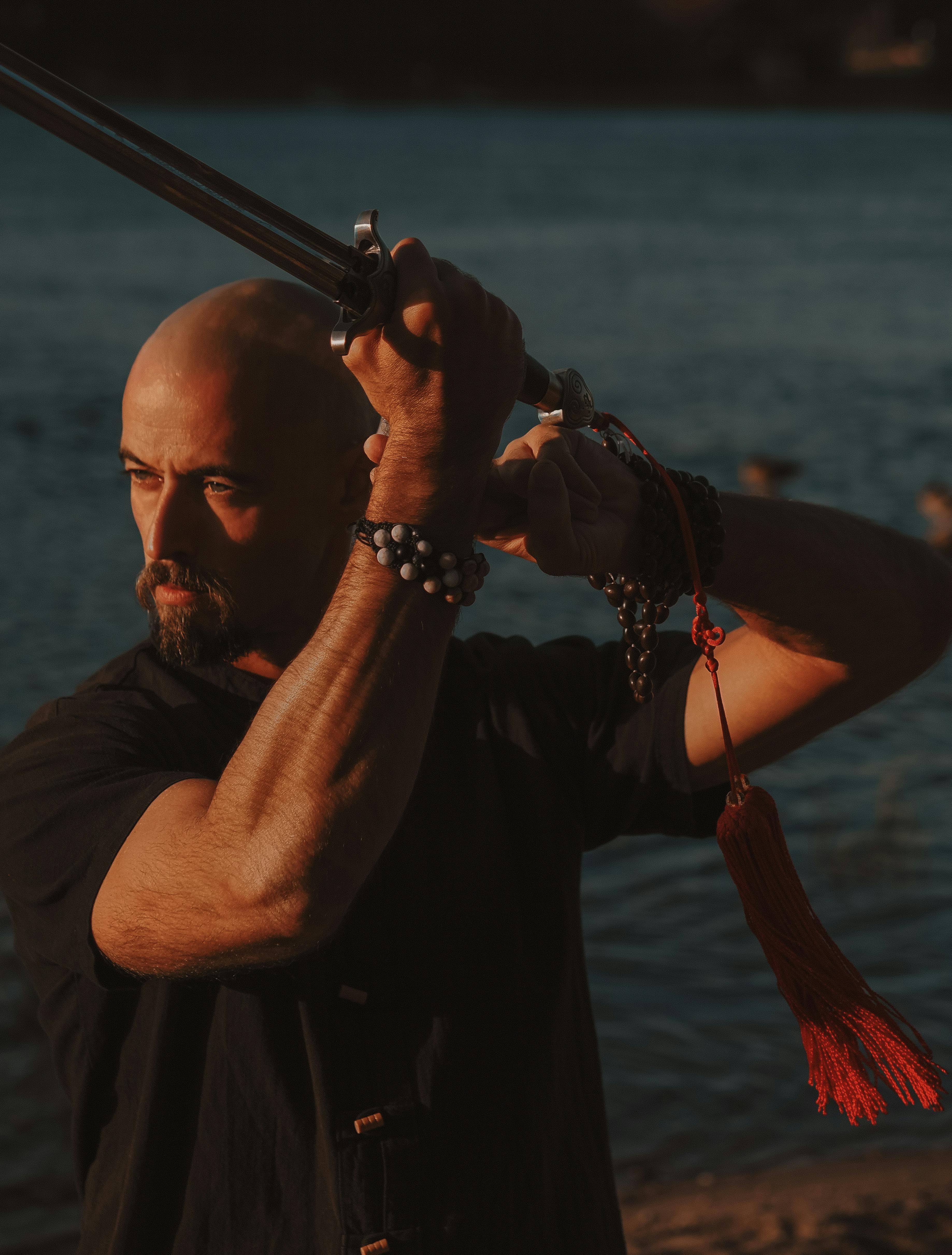 Man holding a Sword · Free Stock Photo