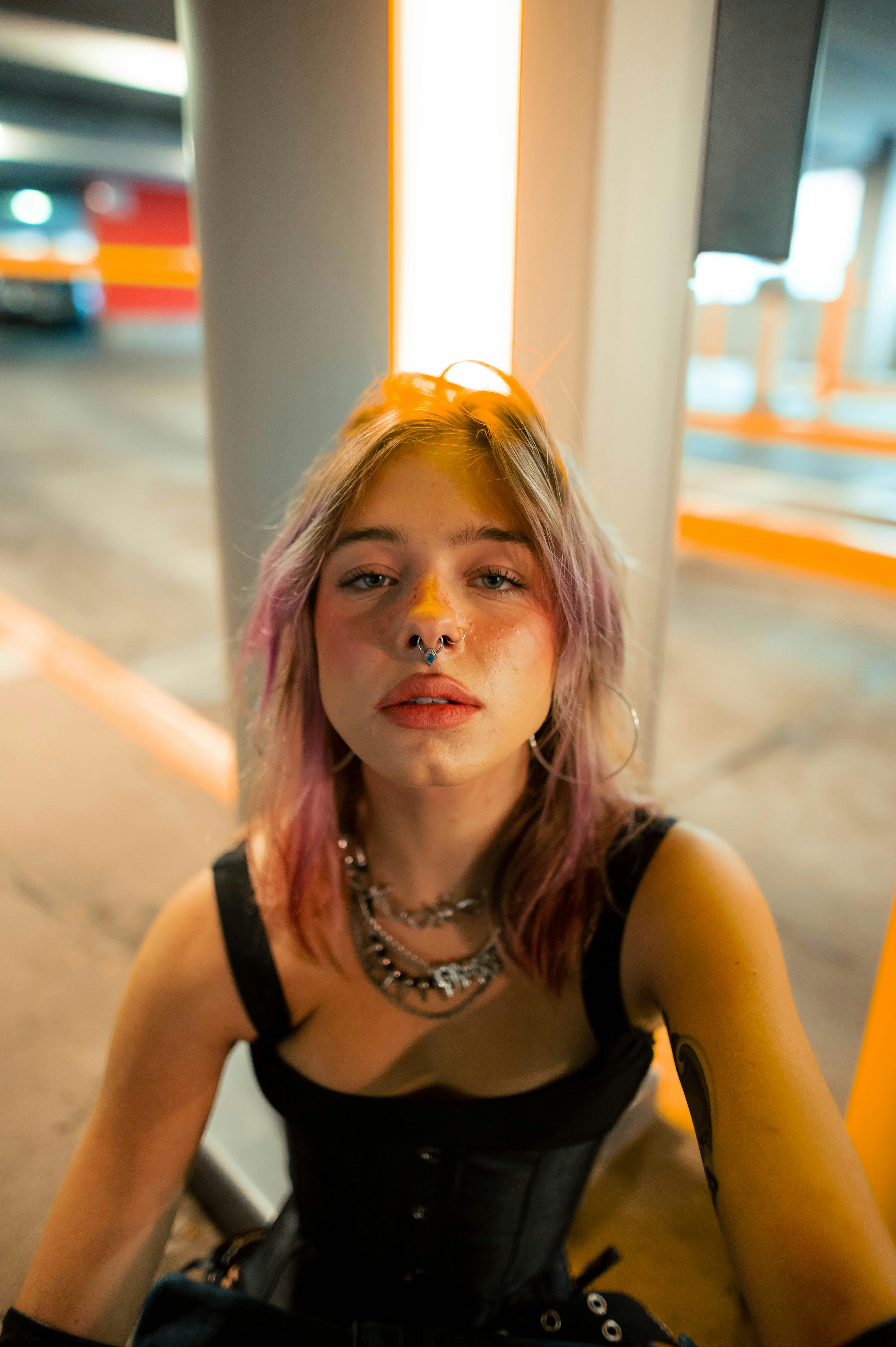 A Woman in White Tank Top Wearing Eyeglasses · Free Stock Photo