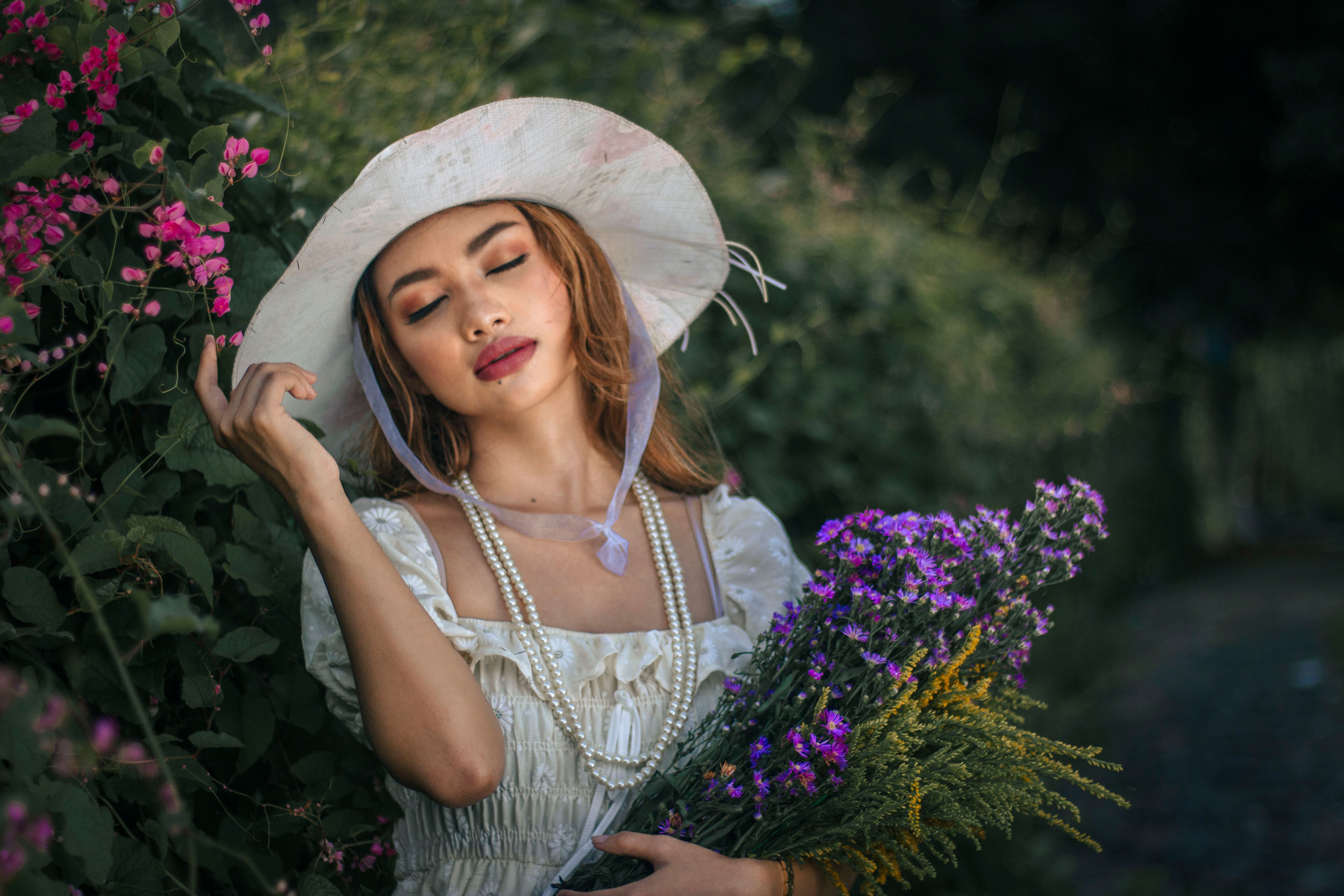 Attractive Woman Wearing Sun Hat · Free Stock Photo