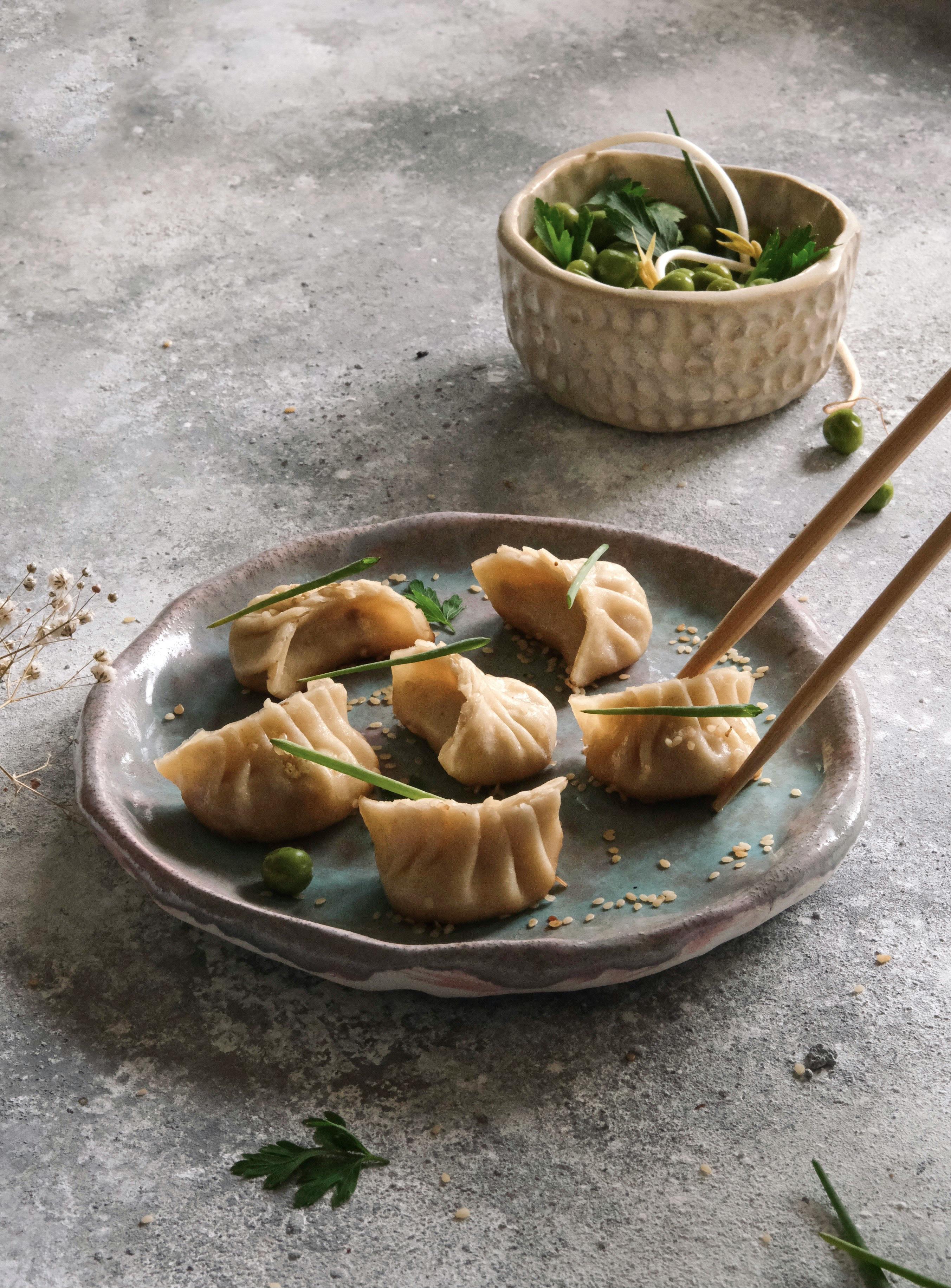 Dumplings on Brown and Green Ceramic Plate · Free Stock Photo