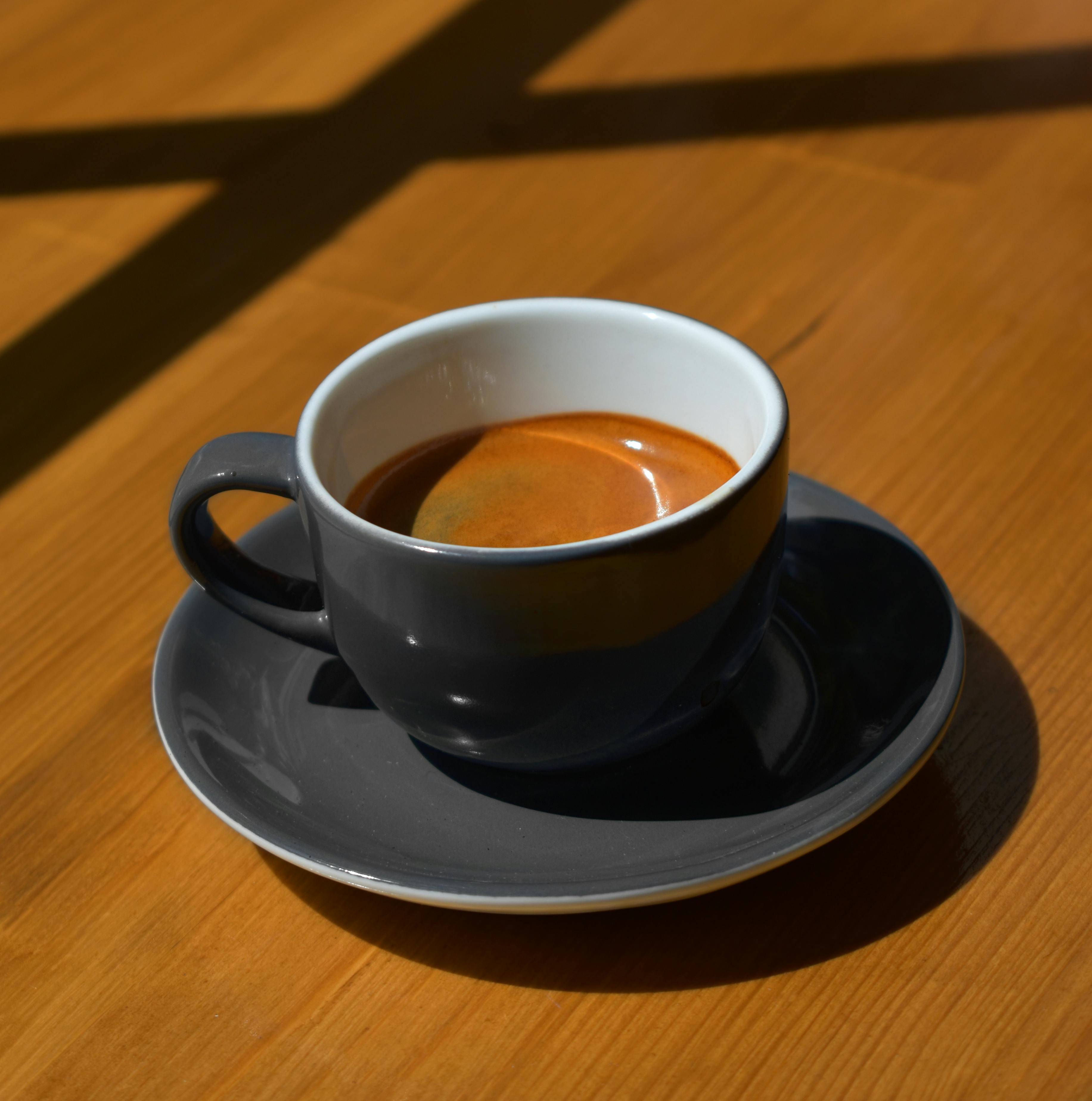Photo of a Gray Cup with Coffee · Free Stock Photo
