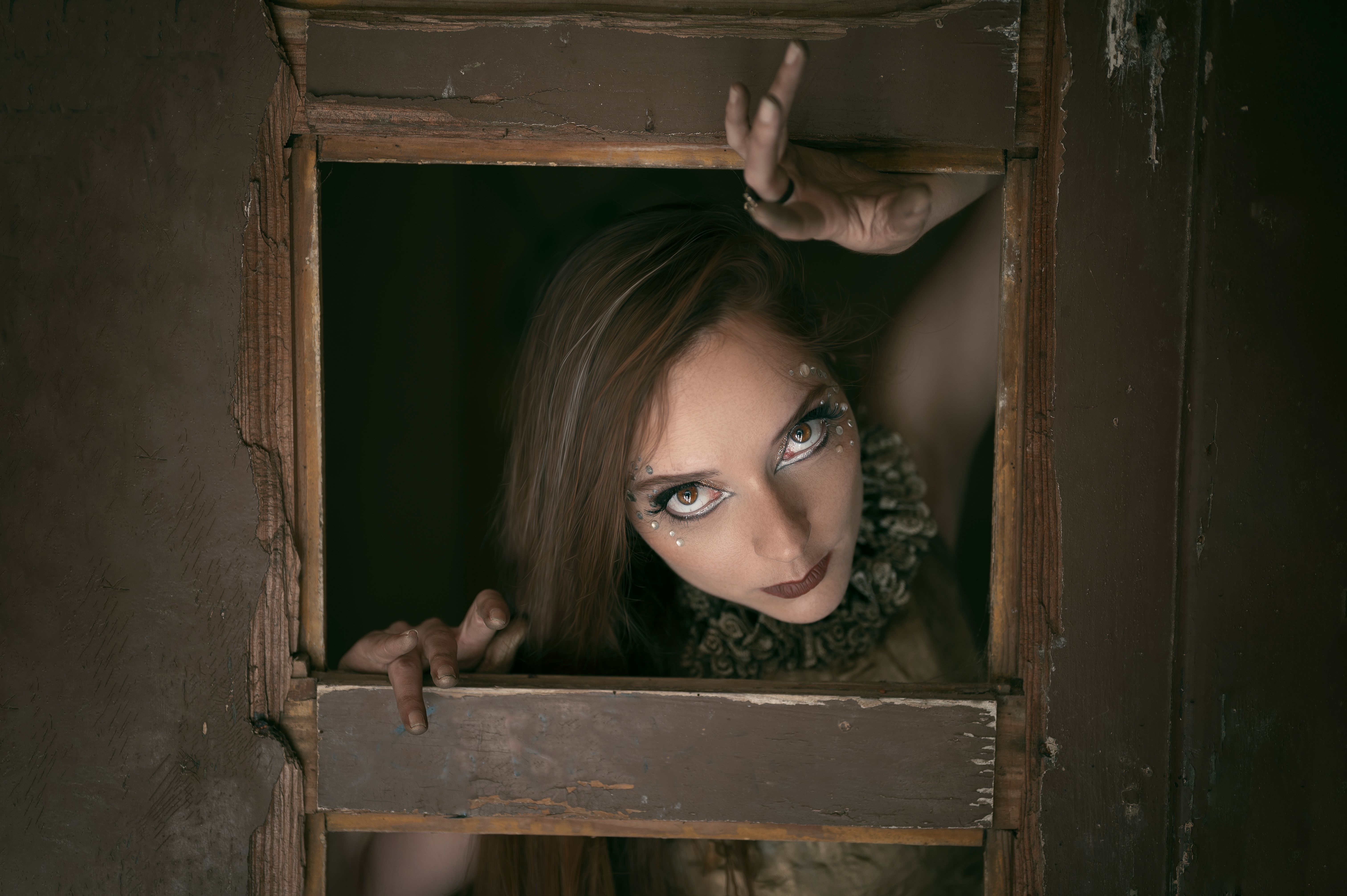 A Woman Looking at the Camera · Free Stock Photo
