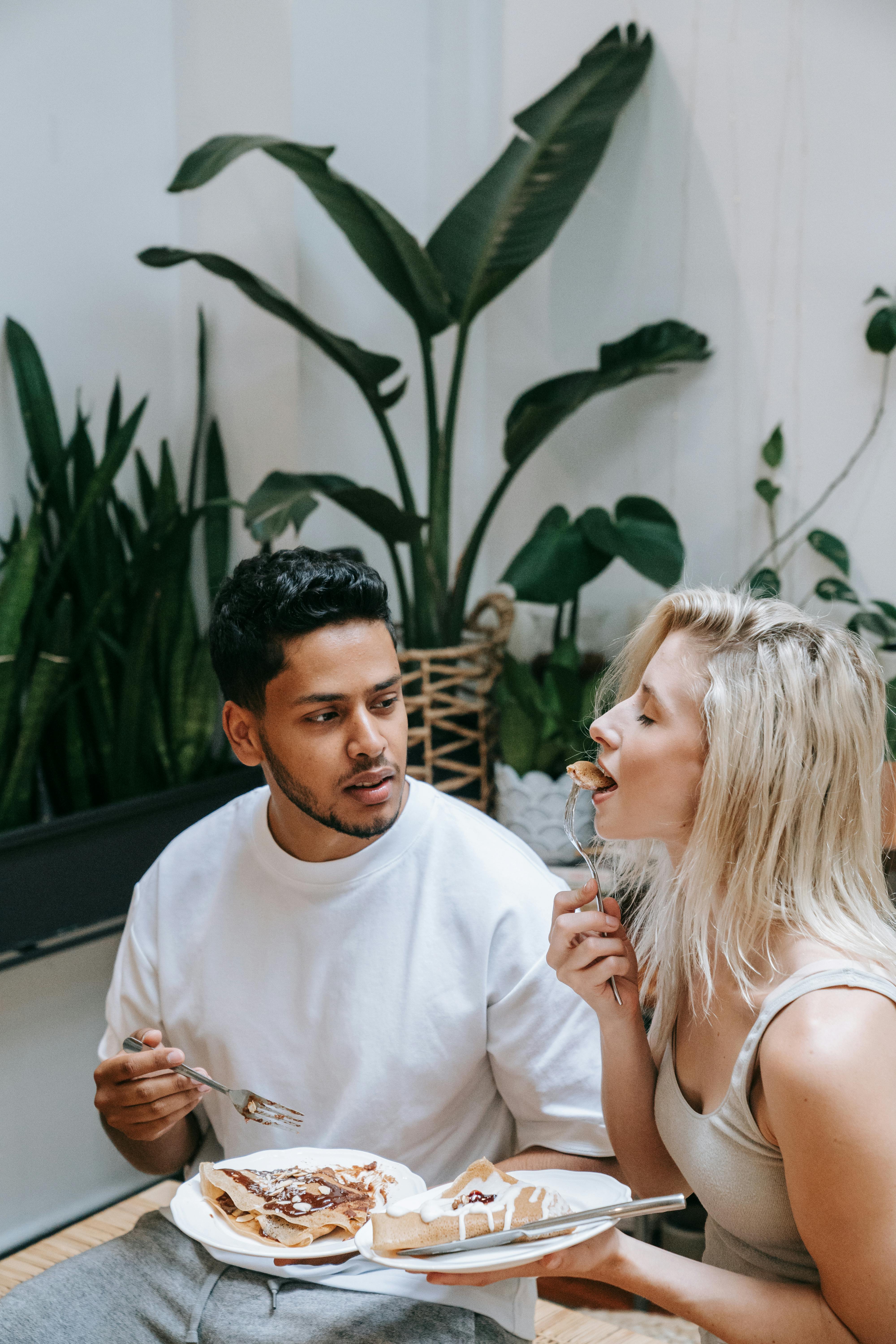 A Couple Eating Together · Free Stock Photo