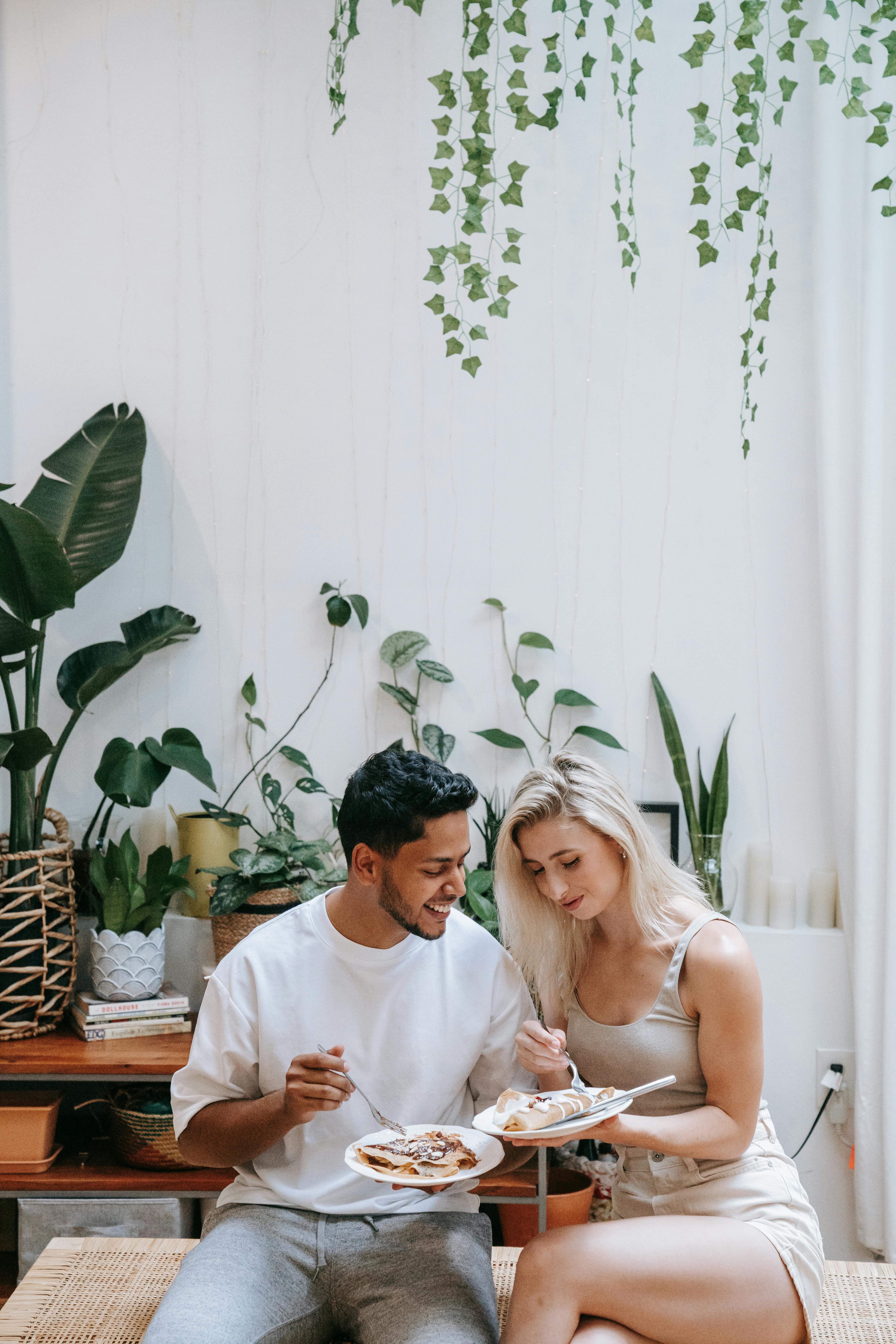Couple Eating Together · Free Stock Photo