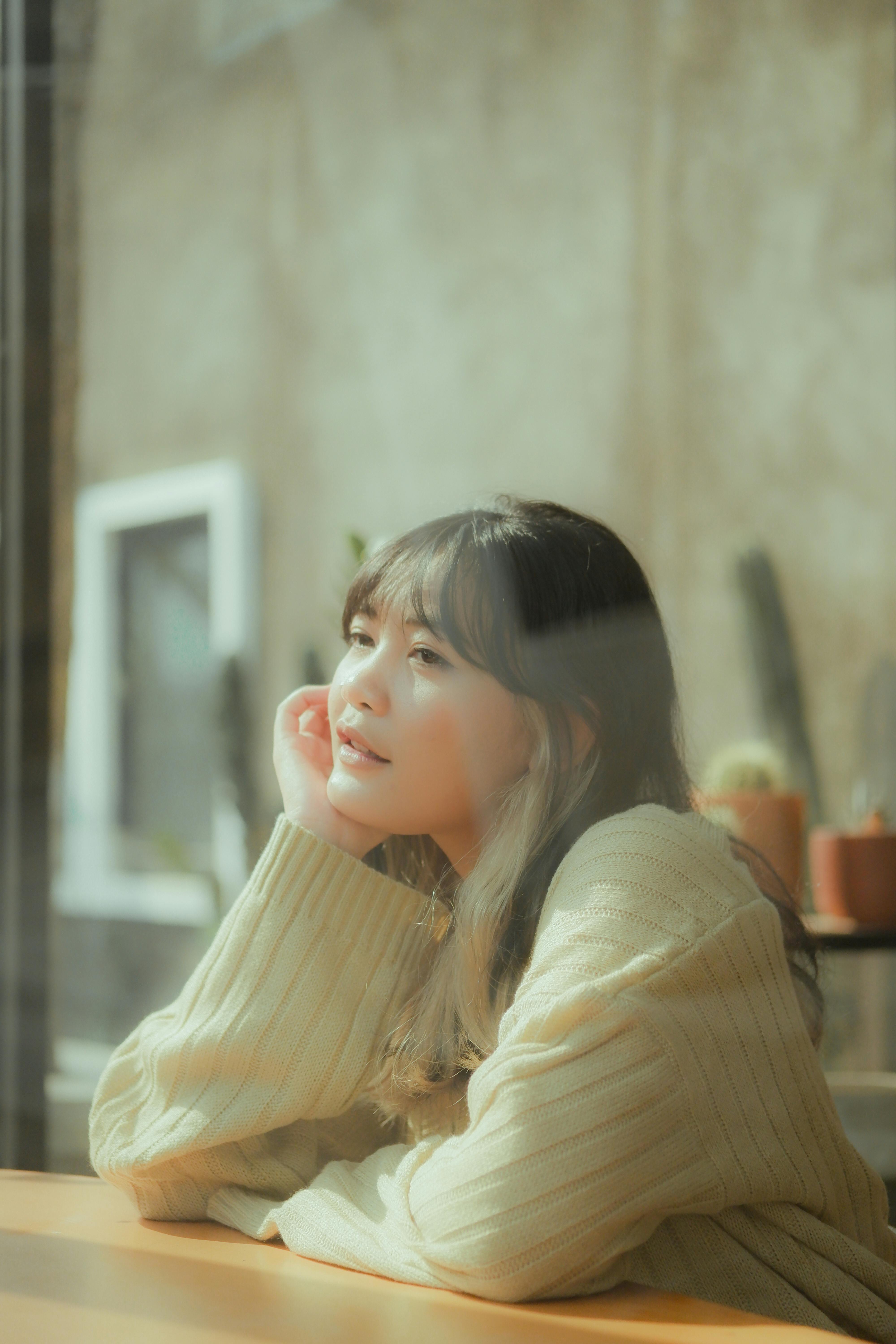 A Cosplayer Sitting on a Curb · Free Stock Photo