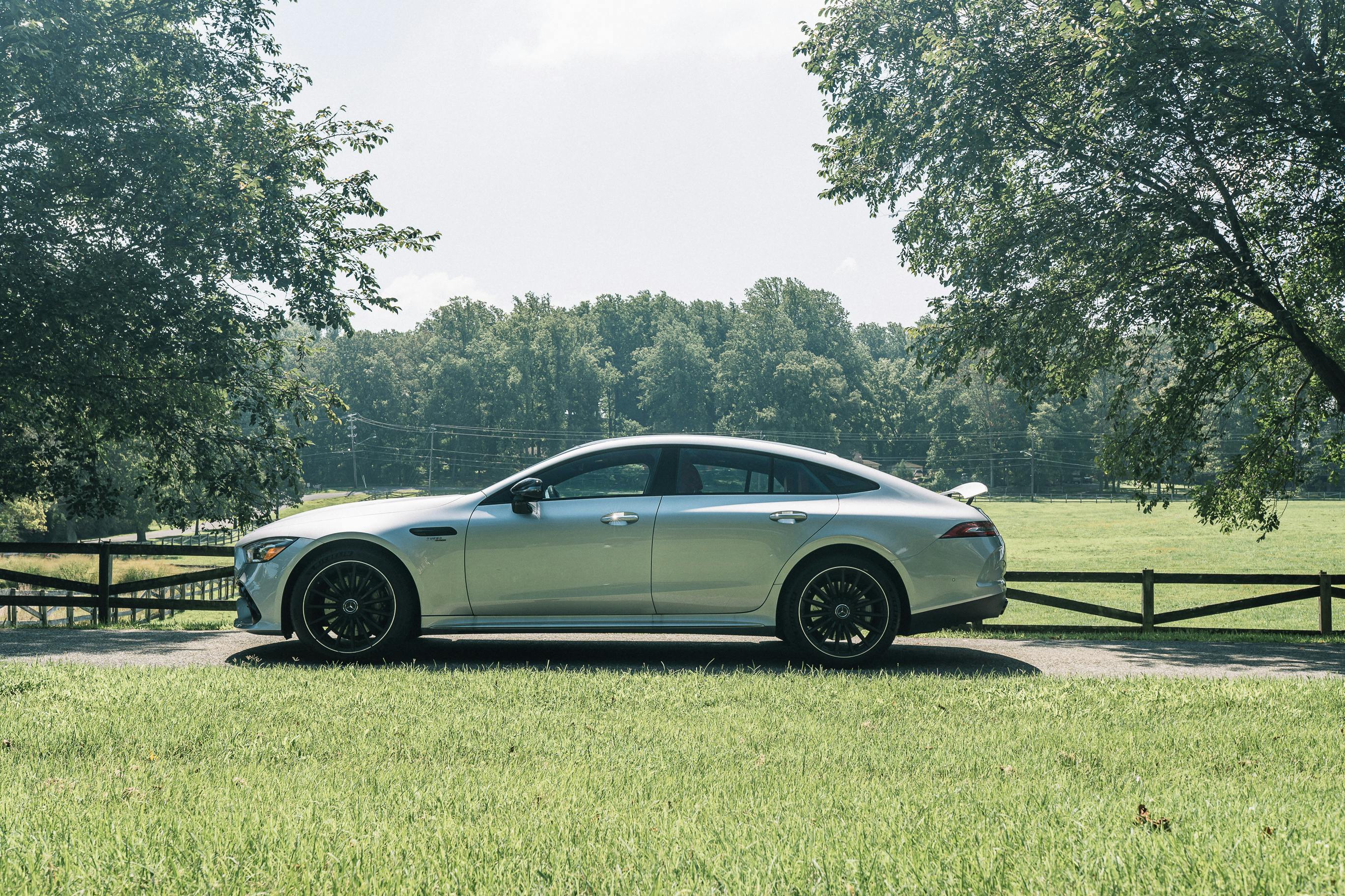 A Car Parked on the Driveway · Free Stock Photo