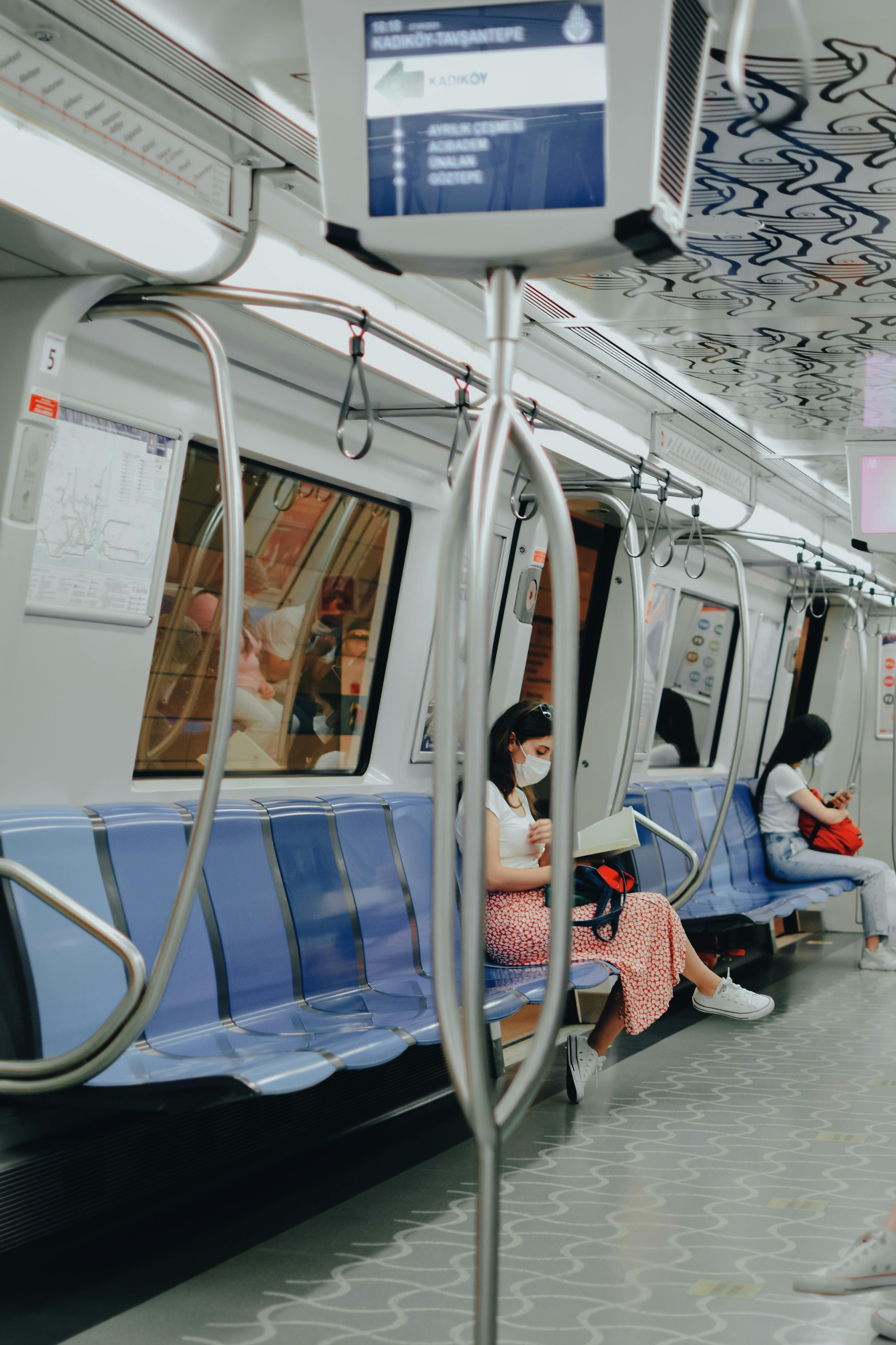 People Riding a Train · Free Stock Photo