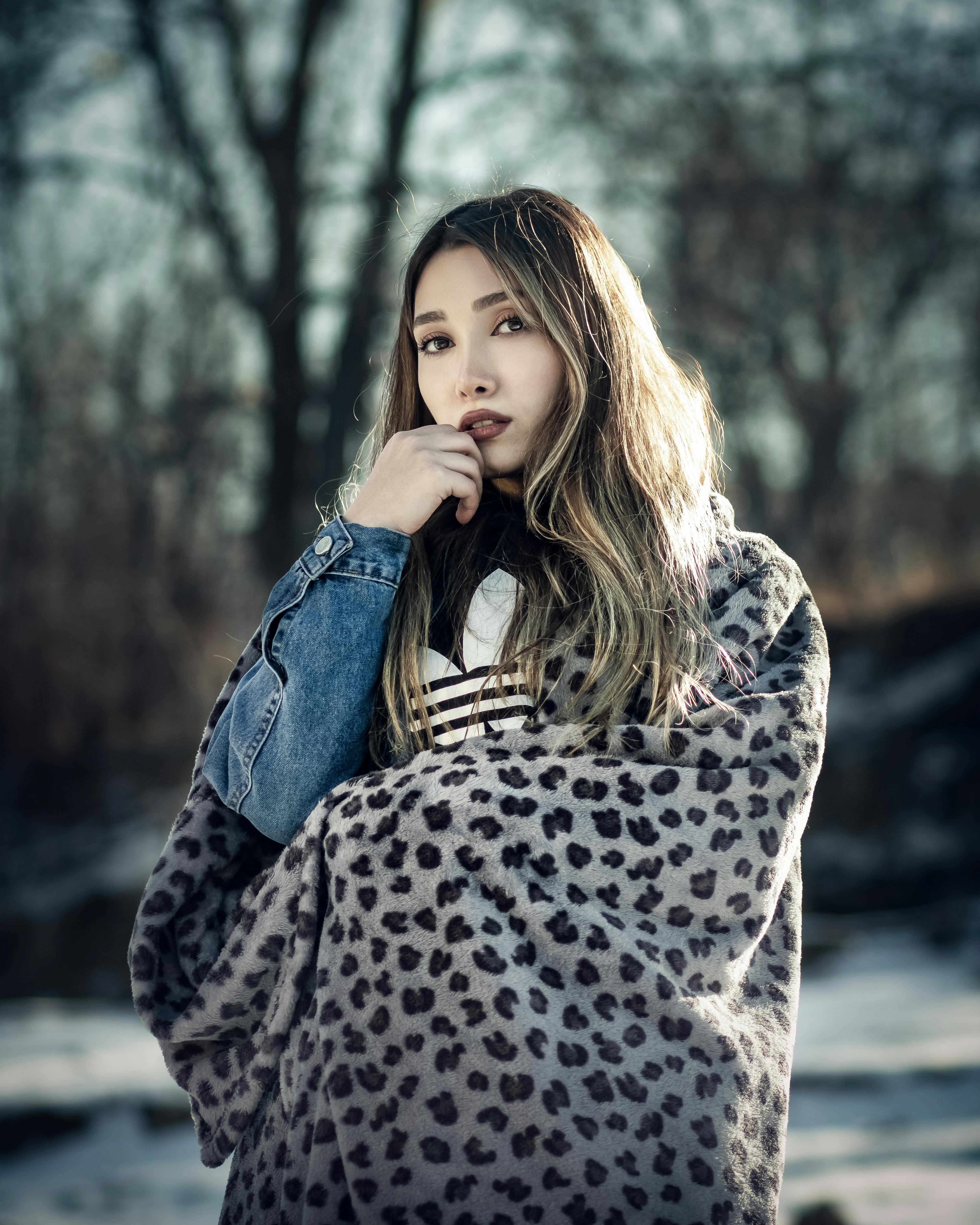 Woman with a Blanket Over her Shoulder · Free Stock Photo