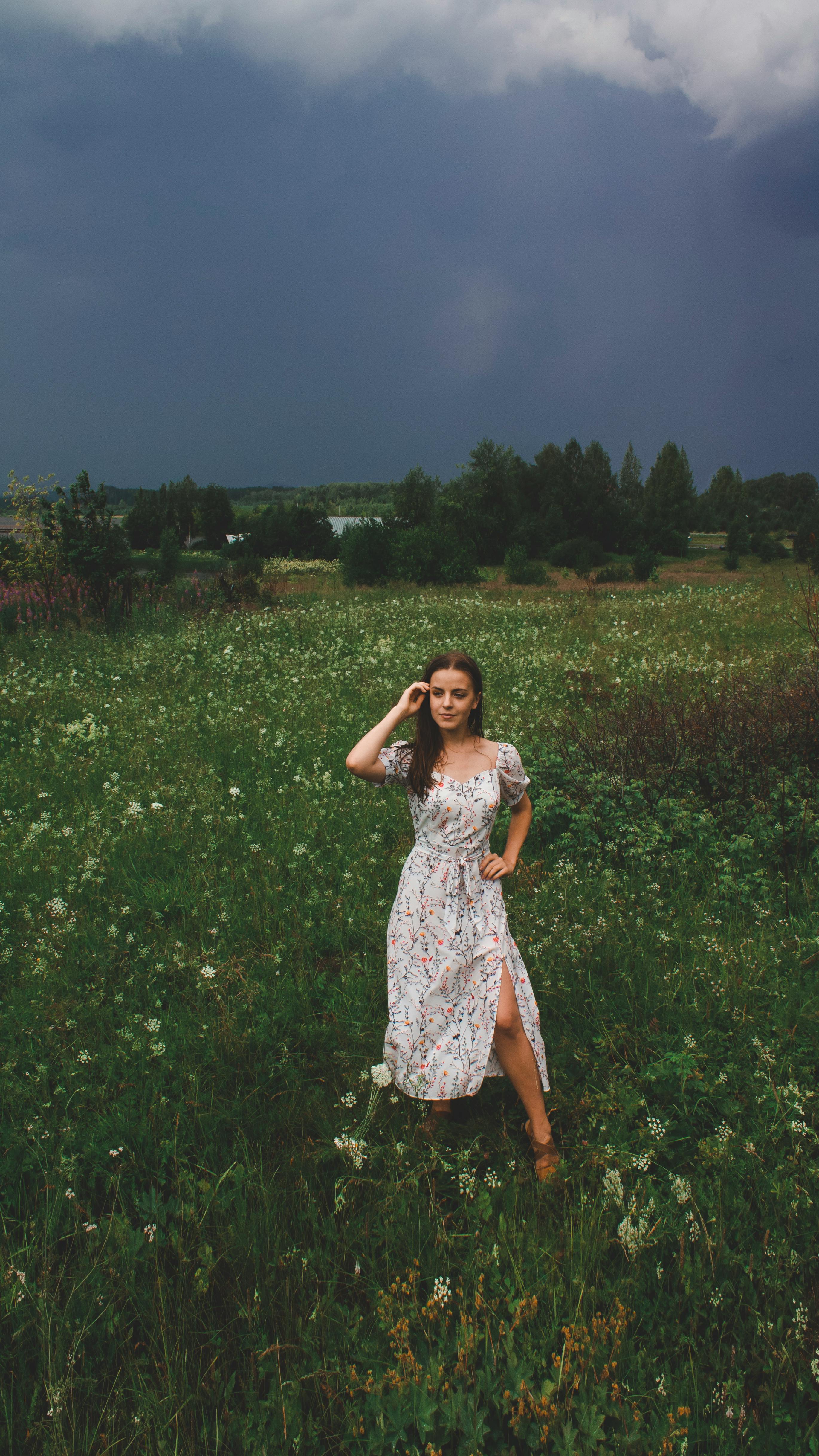 Girl in Floral Dress Standing on Flower Field · Free Stock Photo