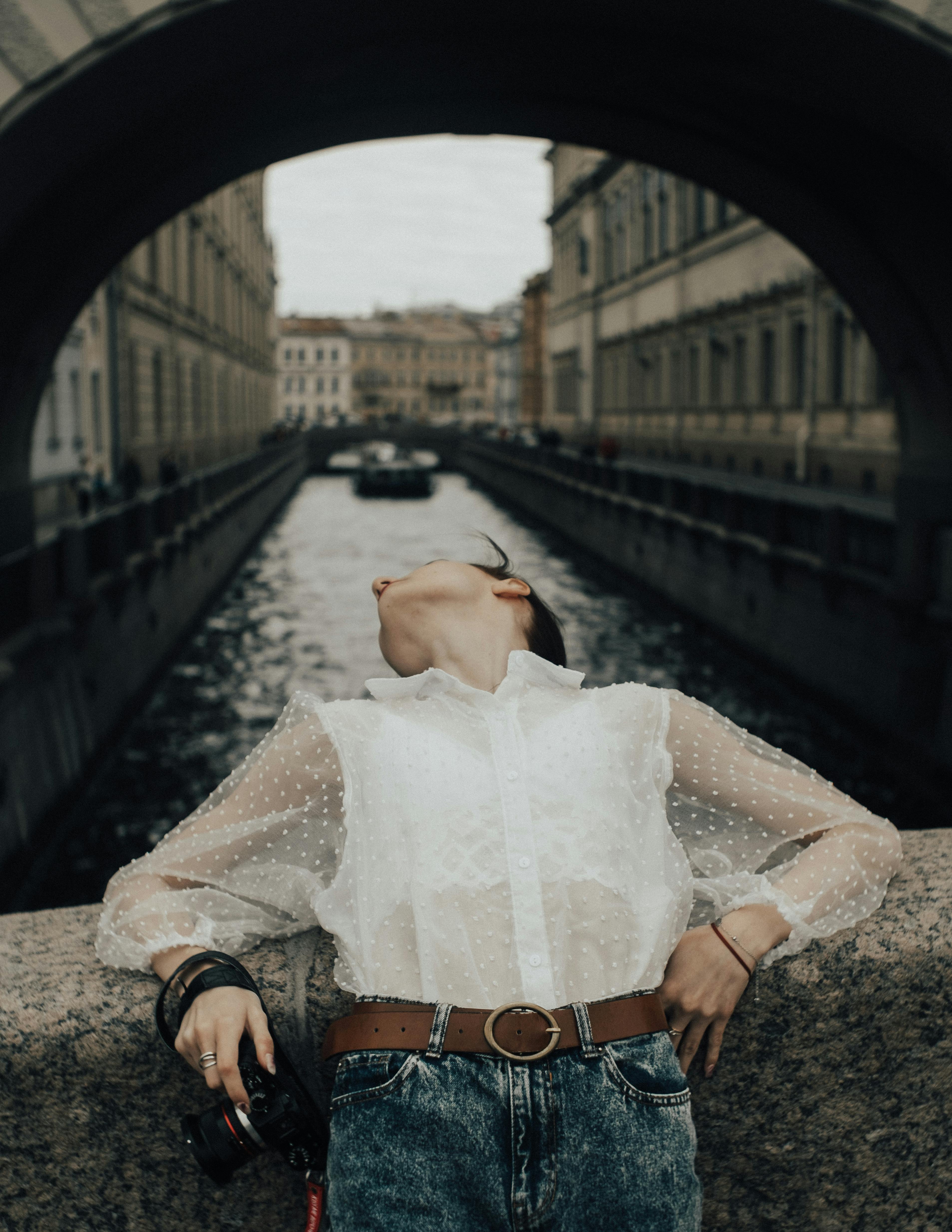 Woman Posing on Bridge · Free Stock Photo
