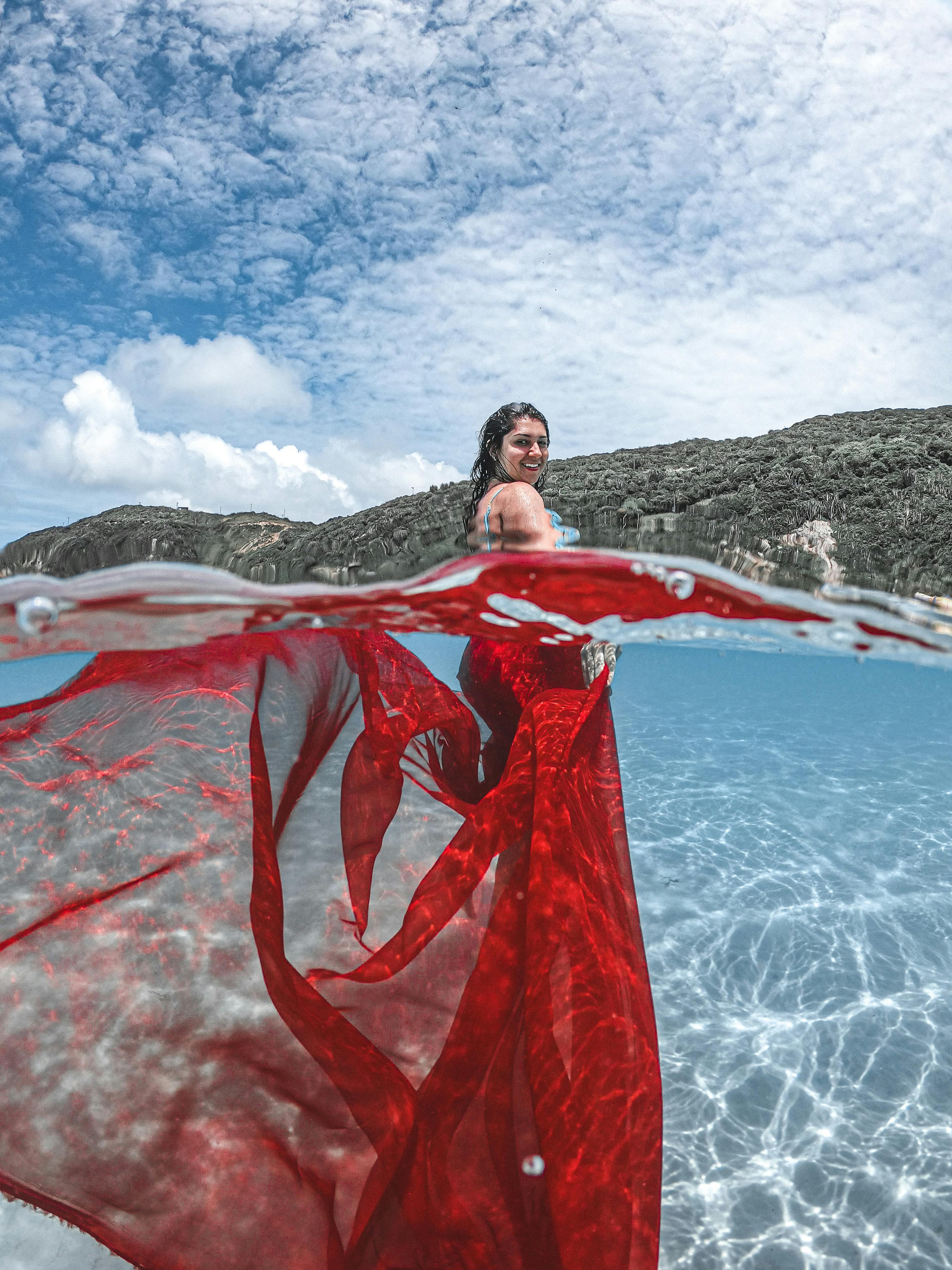 Beautiful Woman Wearing Dress Swimming in Sea · Free Stock Photo