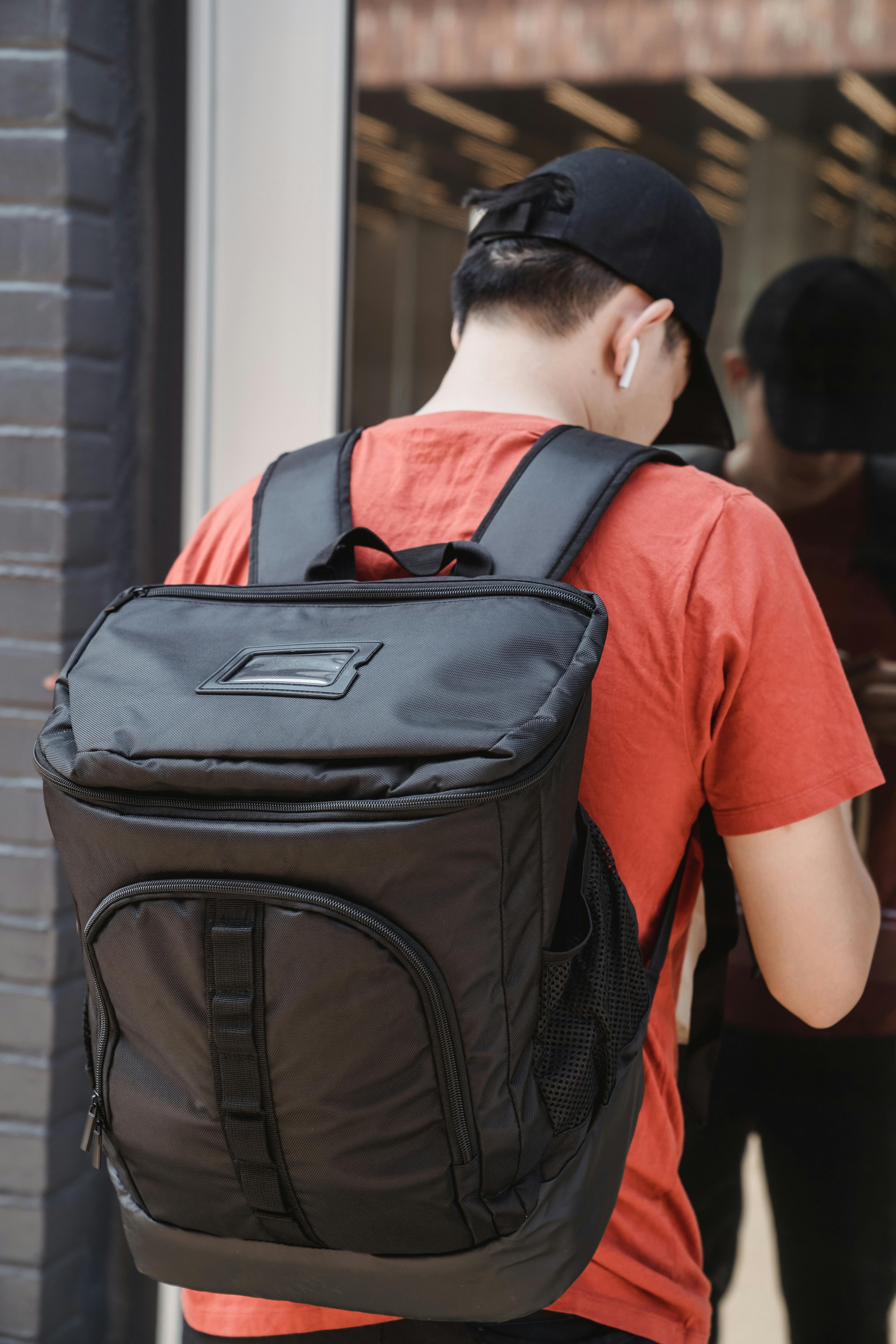 Man with a Backpack Carrying his Things While in the Forest · Free ...