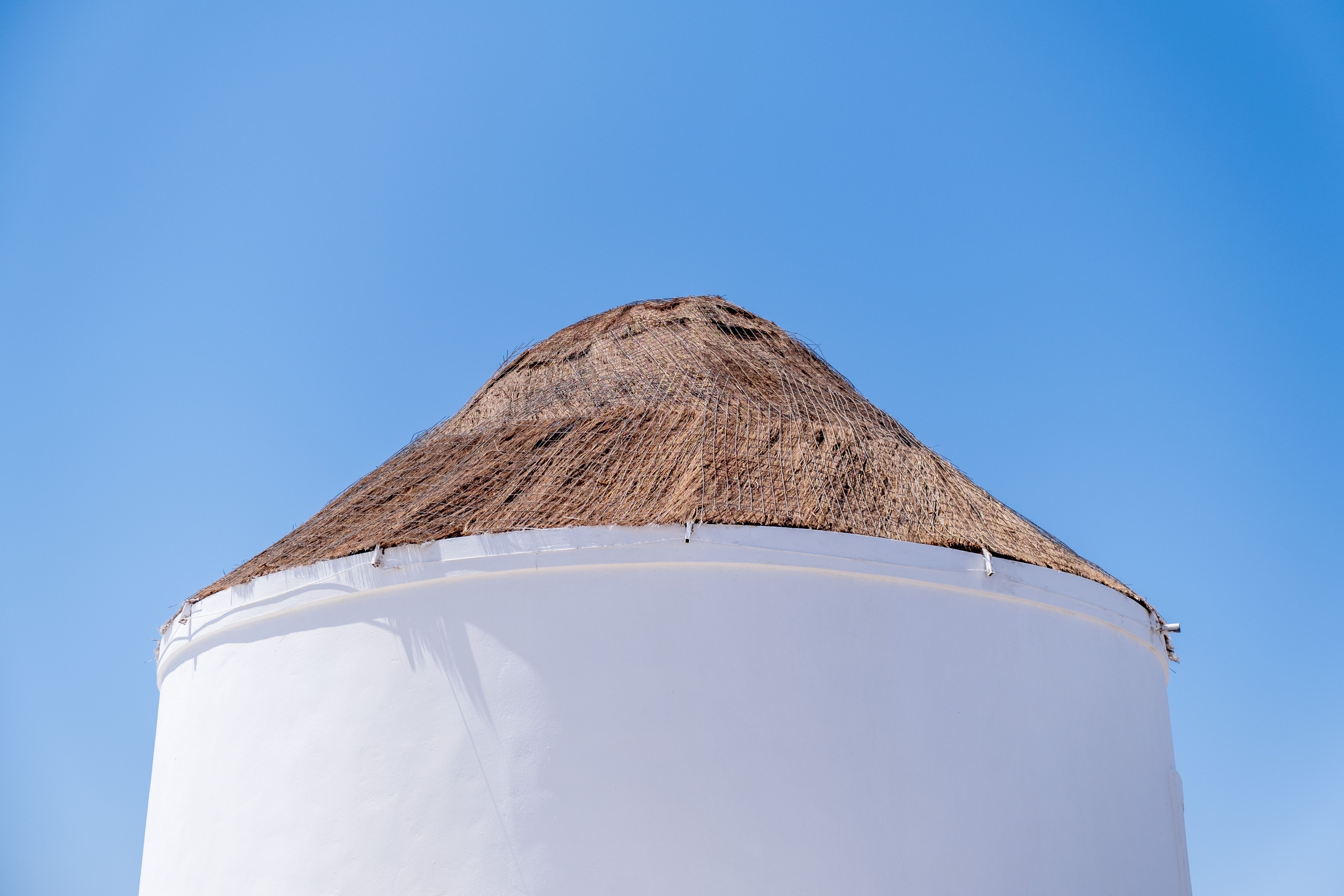 White Triangle House Roof with a Chimney · Free Stock Photo