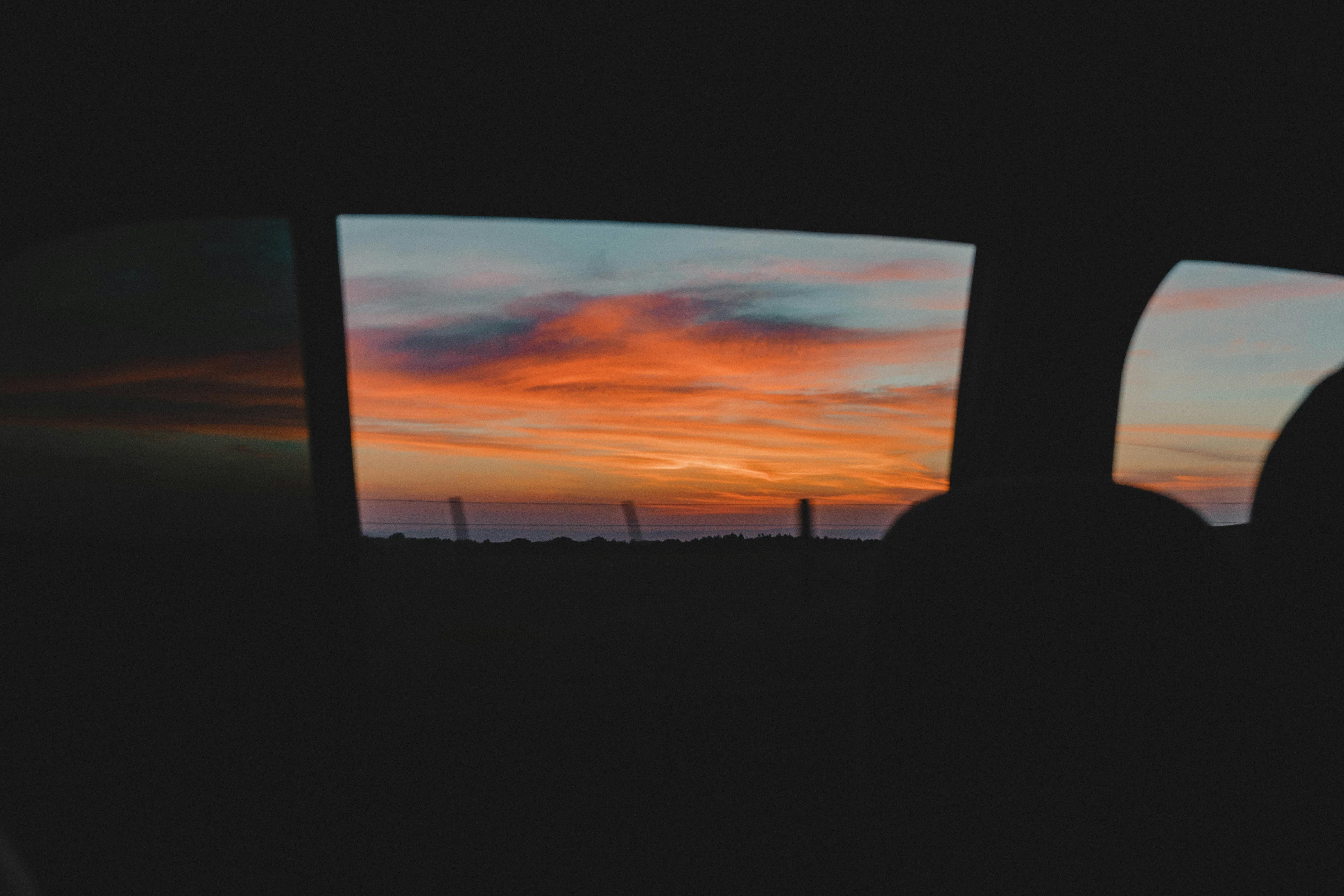 View of Sunset from a Car Window · Free Stock Photo
