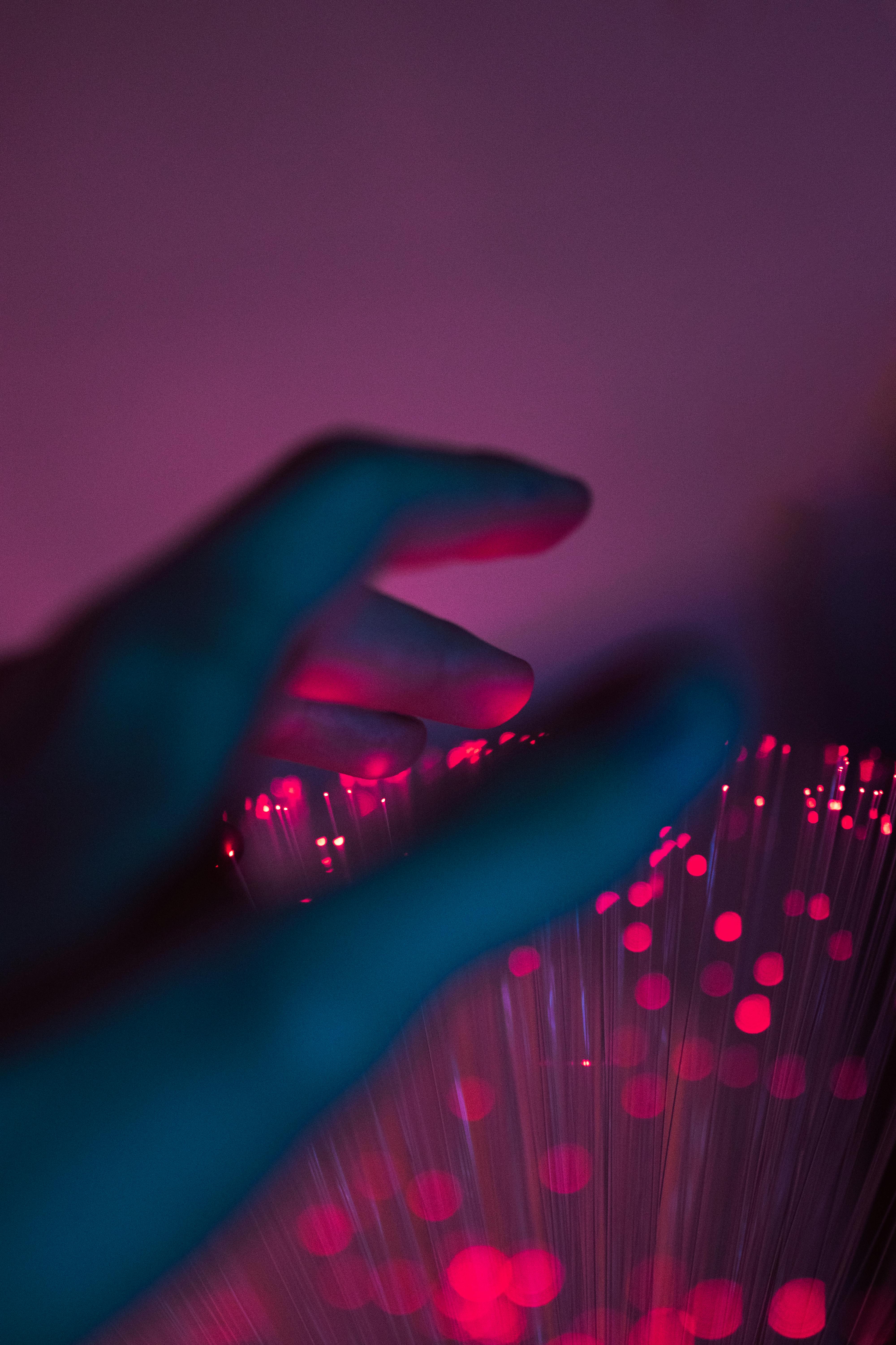 Hand Touching Neon Light Lamp · Free Stock Photo