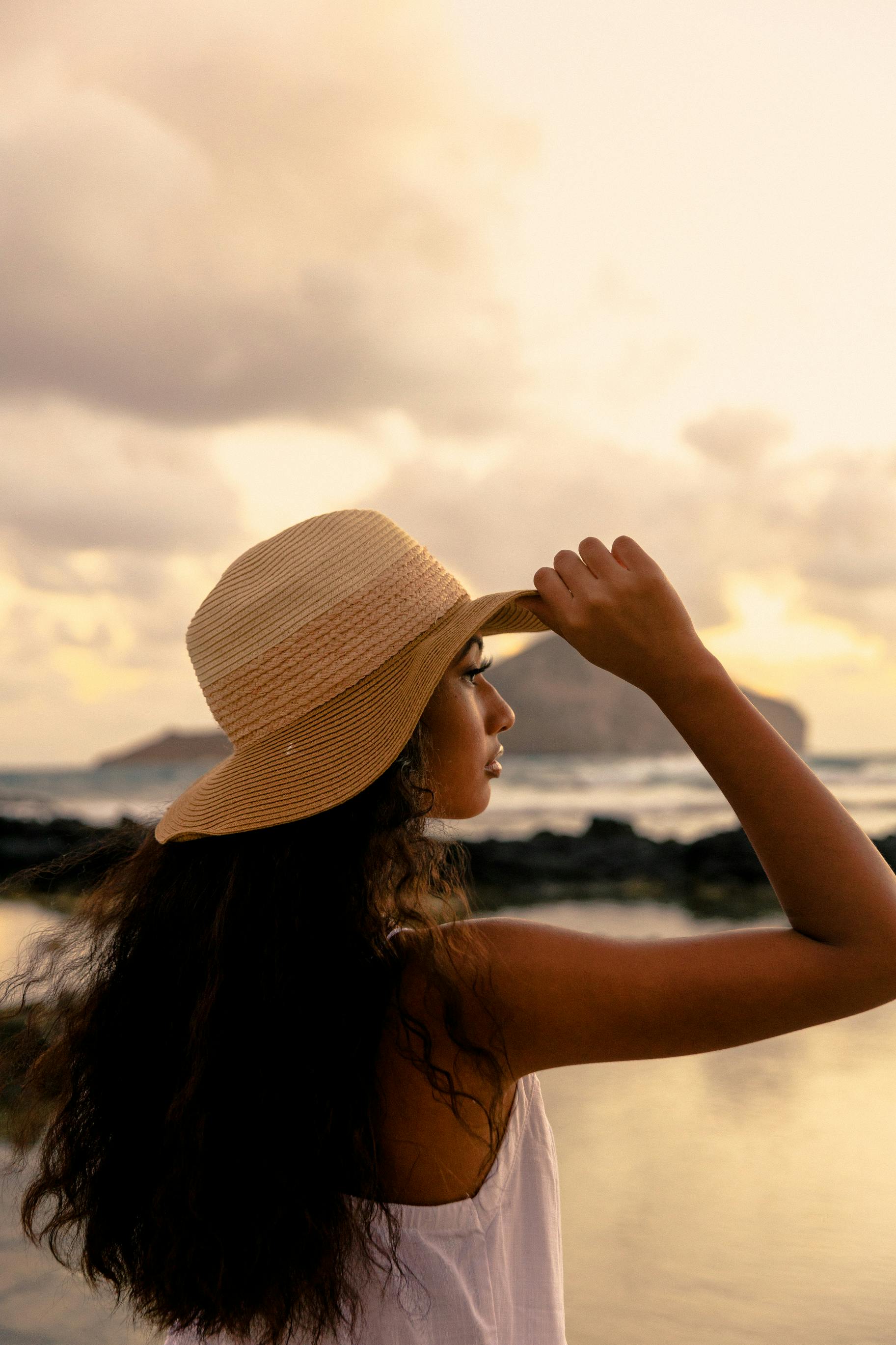 Woman Holding Her Jacket Over Shoulder · Free Stock Photo