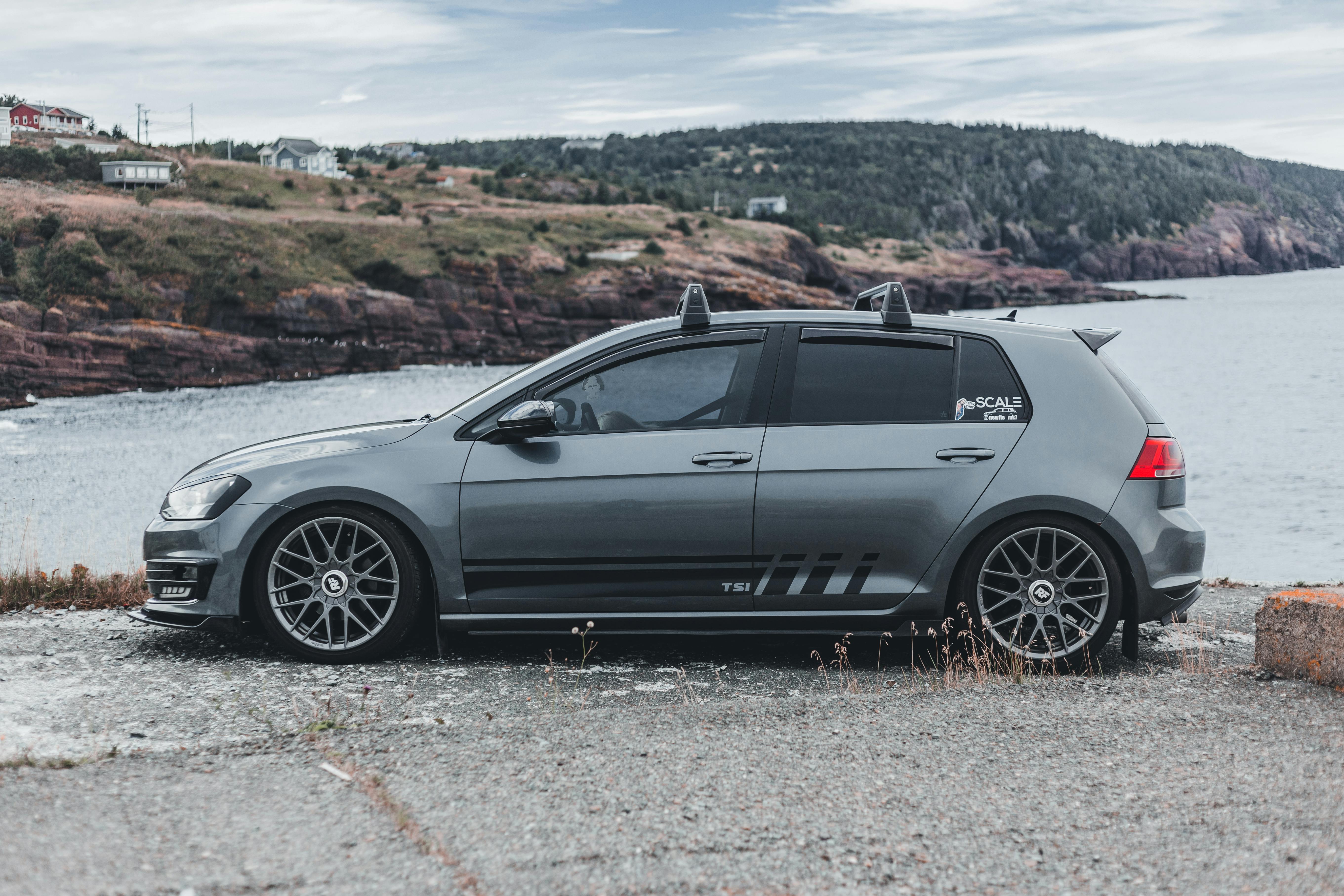 Metallic Gray Car Parked Near Sea · Free Stock Photo