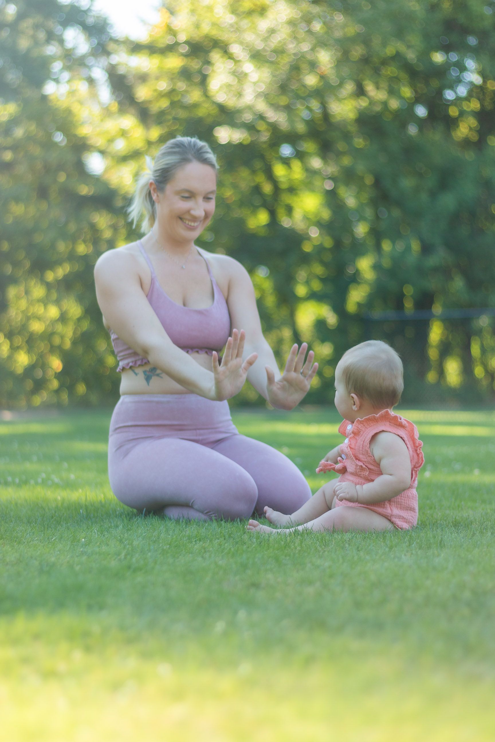 A Mother Sitting with her Child on the Ground · Free Stock Photo