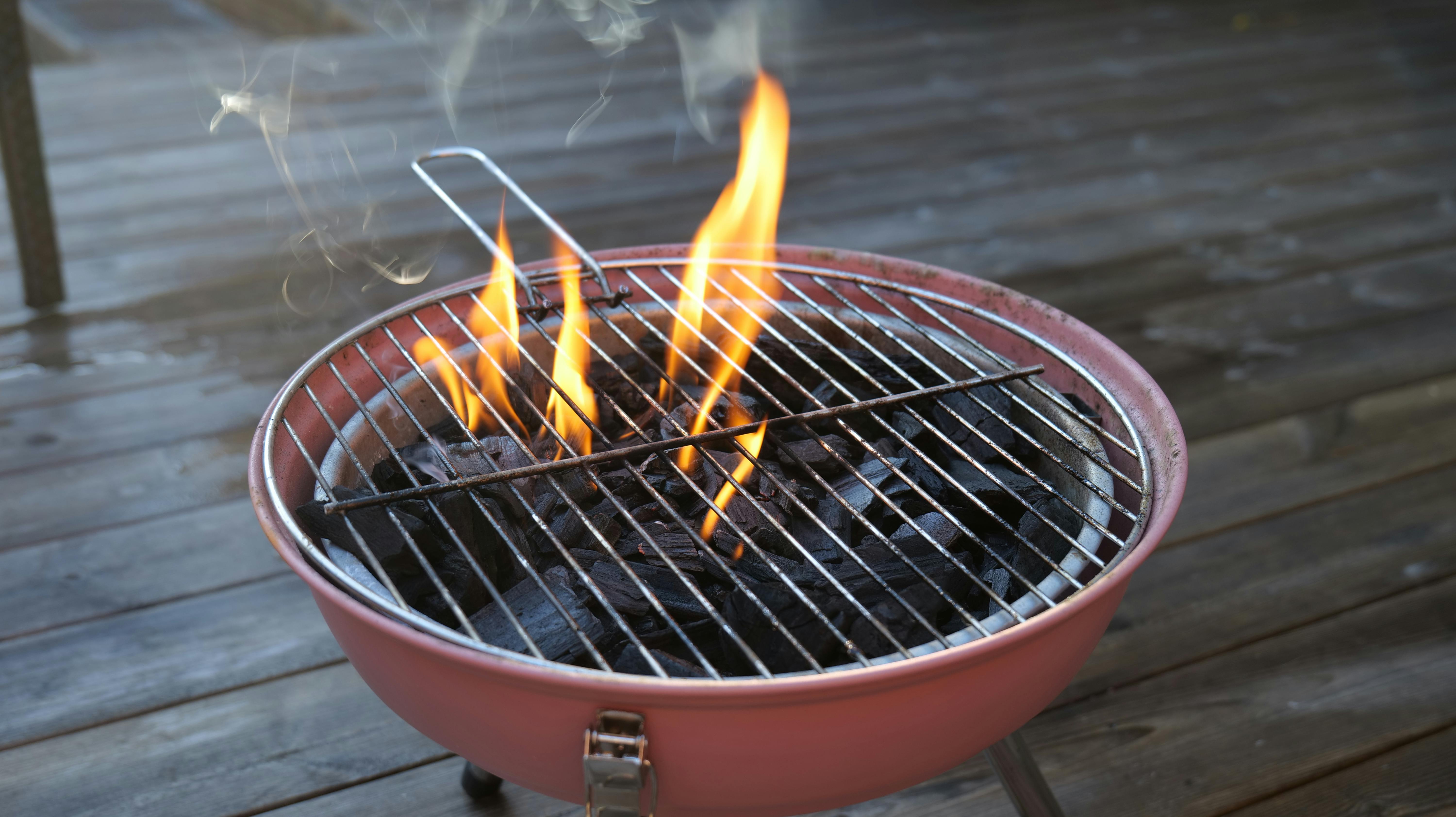 A Griller with Charcoal on Fire · Free Stock Photo